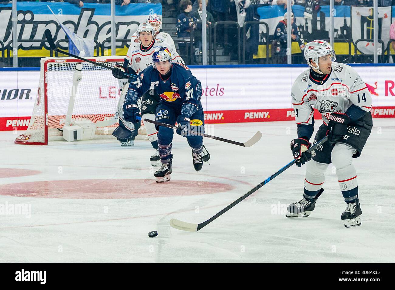 Cole Maier (Nuremberg Ice Tigers, #14) in front of Adam Brooks (EHC Red ...