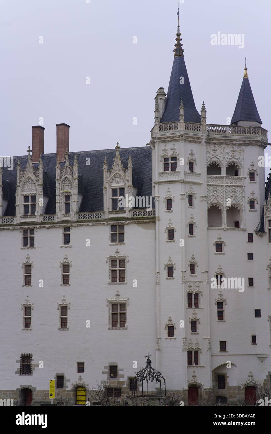 Historic castle-style building with ornate towers and stone façade in ...