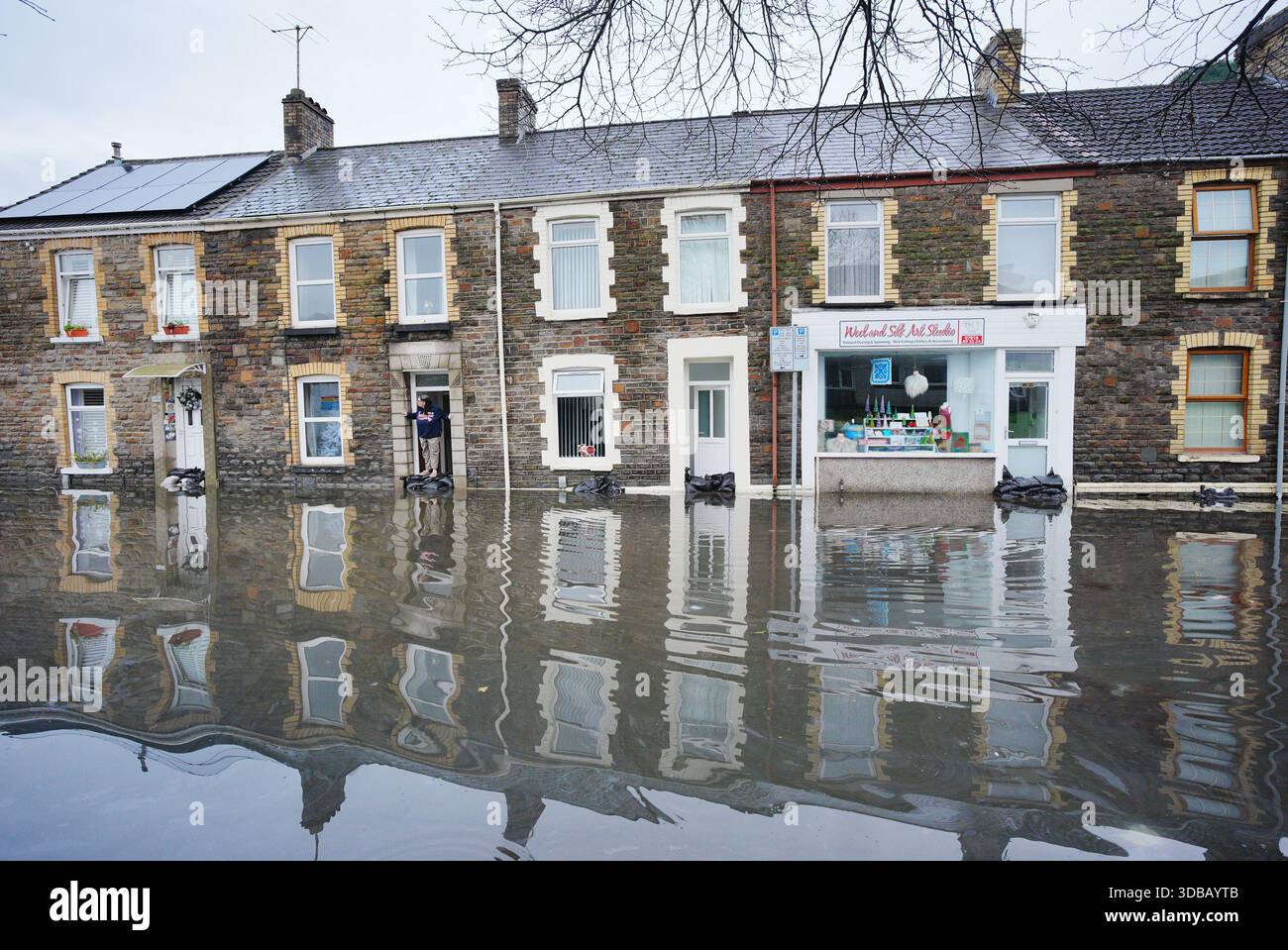 Flood water on Hunter Street in Briton Ferry, Neath. An amber rain ...
