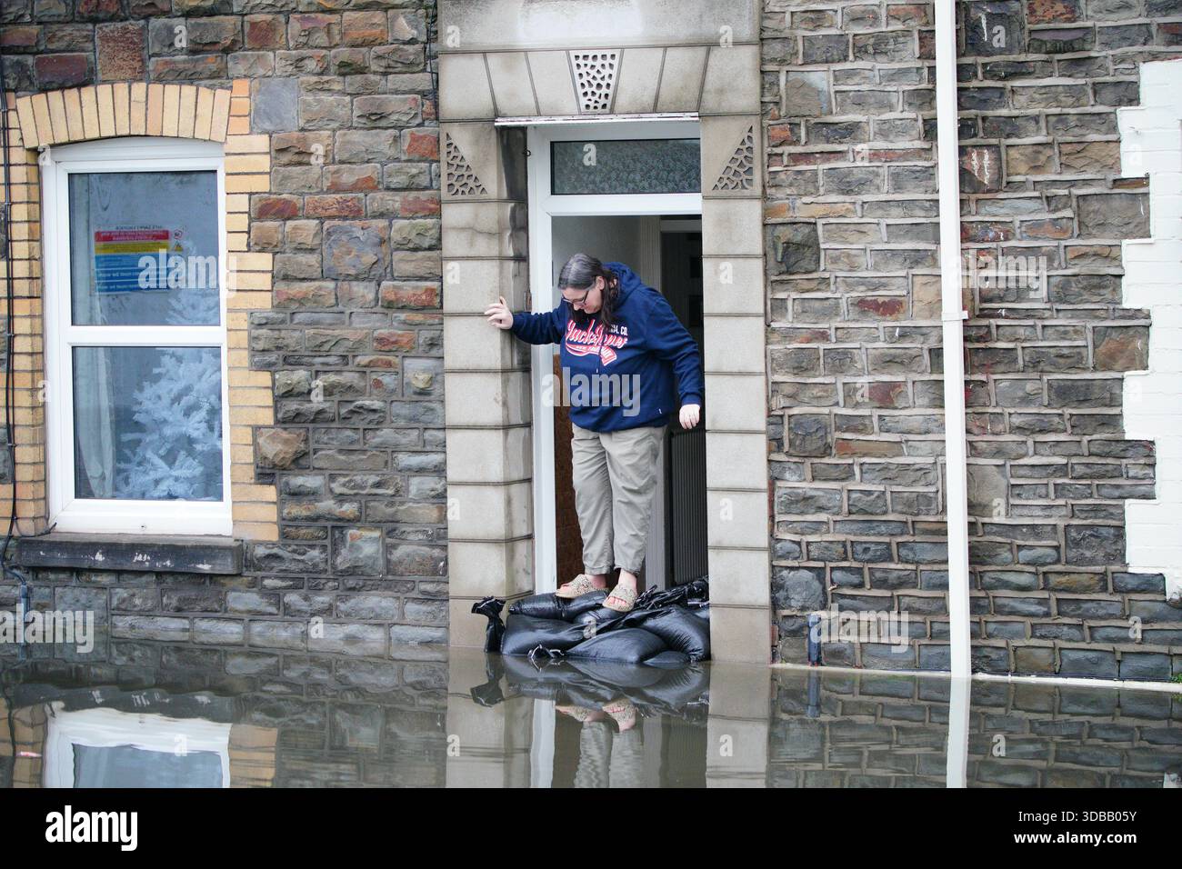 Flood water on Hunter Street in Briton Ferry, Neath. An amber rain ...