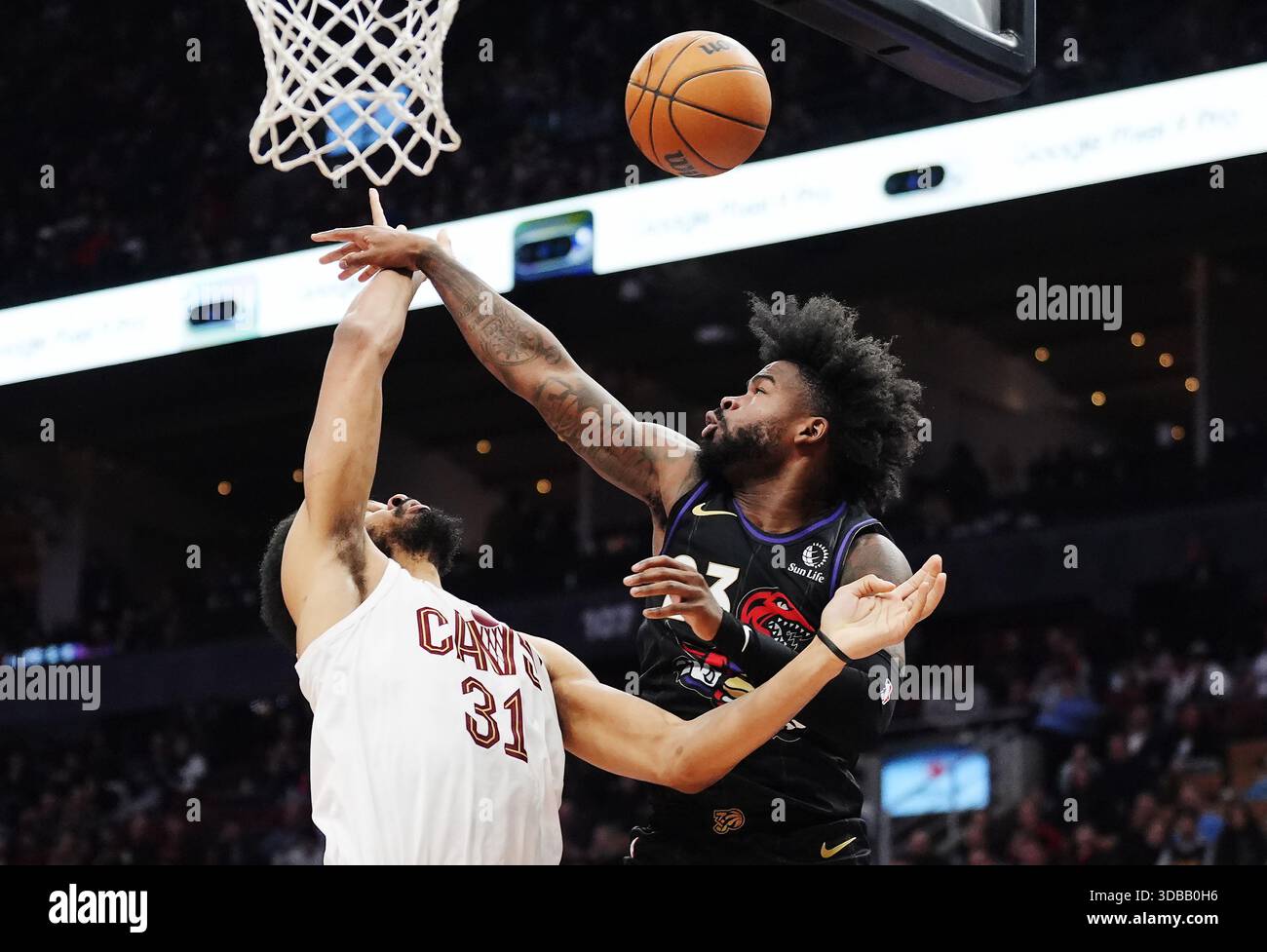 Toronto Raptors' Jamal Shead (right) and Cleveland Cavaliers' Jarrett ...