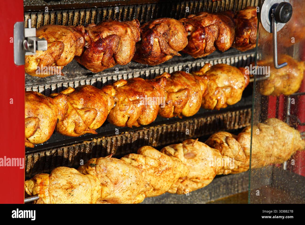 Whole chickens turning on hi-res stock photography and images - Alamy