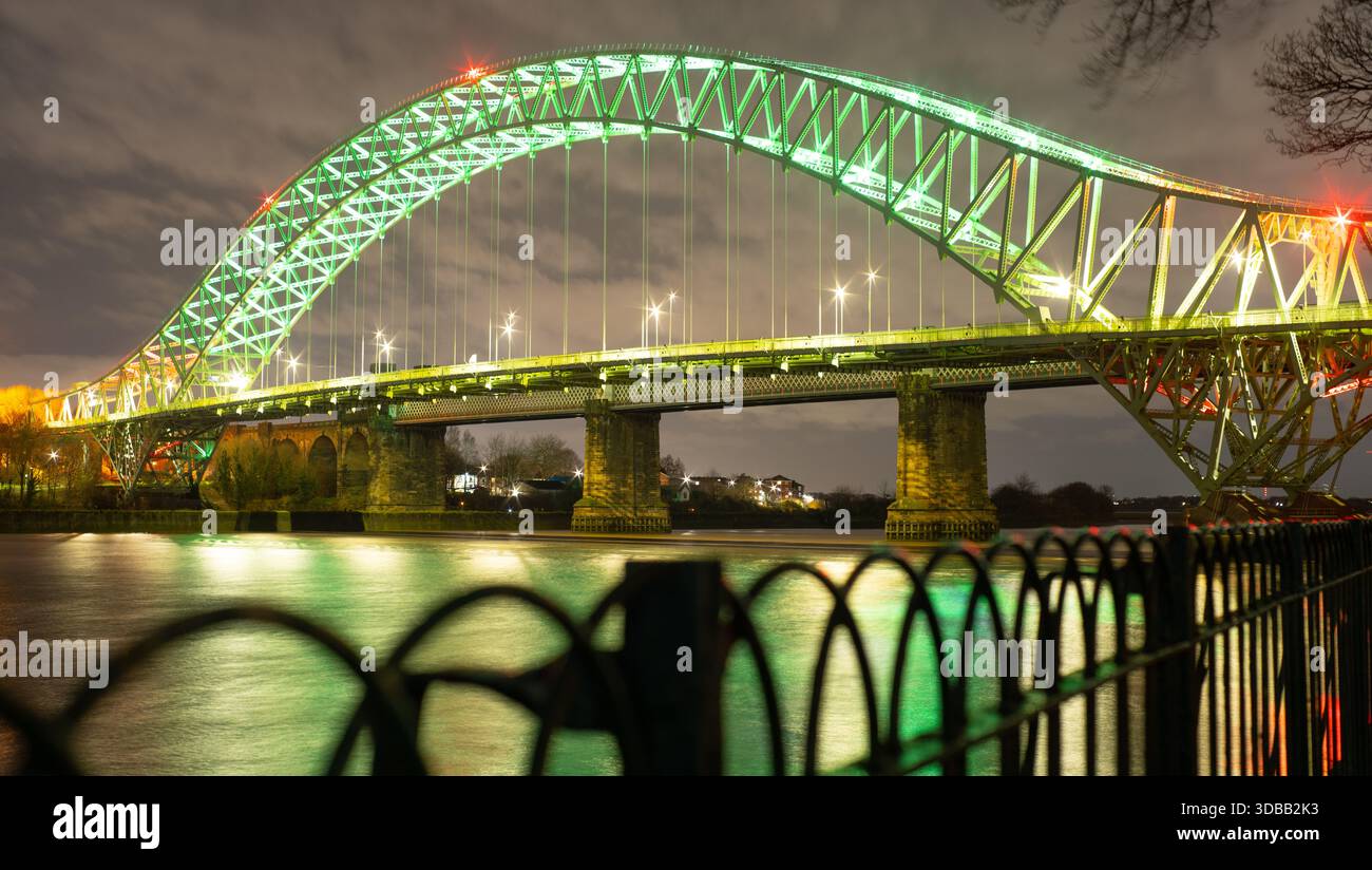 The Silver Jubilee Bridge, crossing the river Mersey, joining Widnes to ...