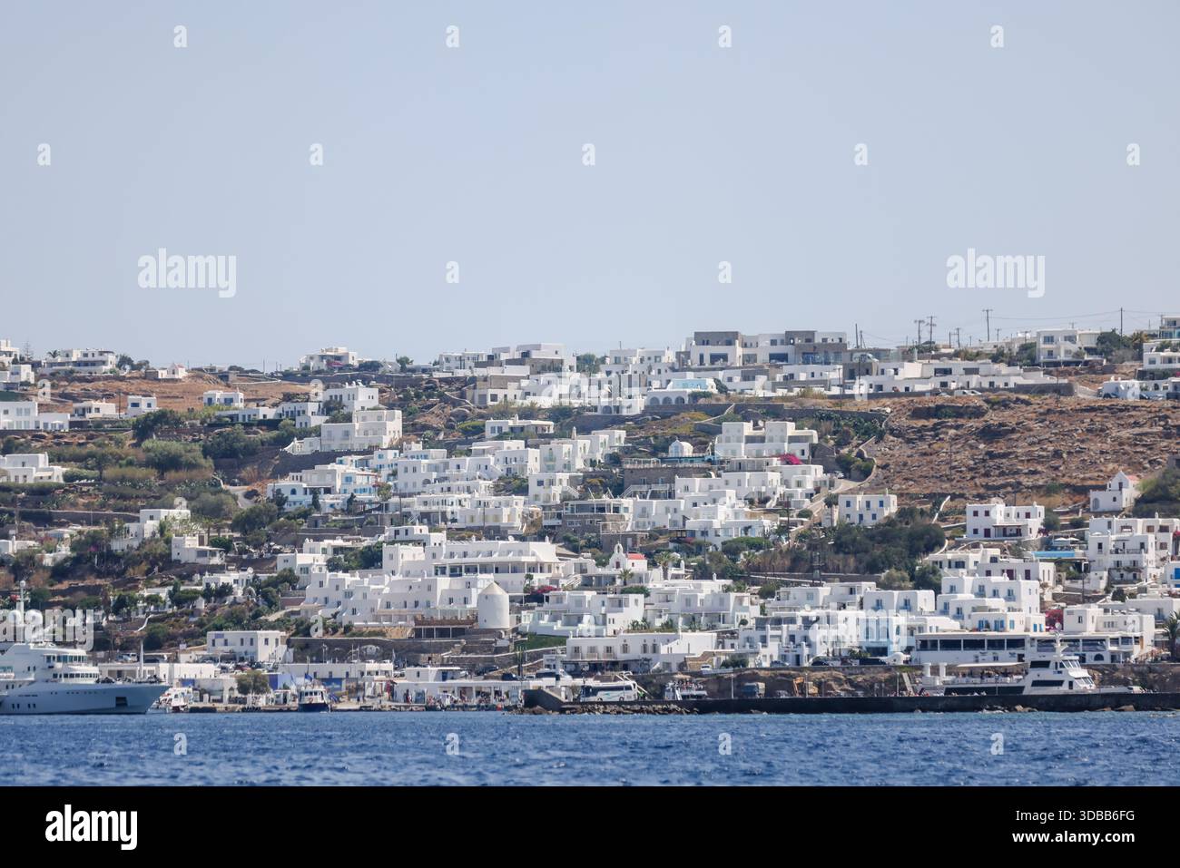 Whitewashed houses climbing the hillside in Mykonos Town, Cyclades ...
