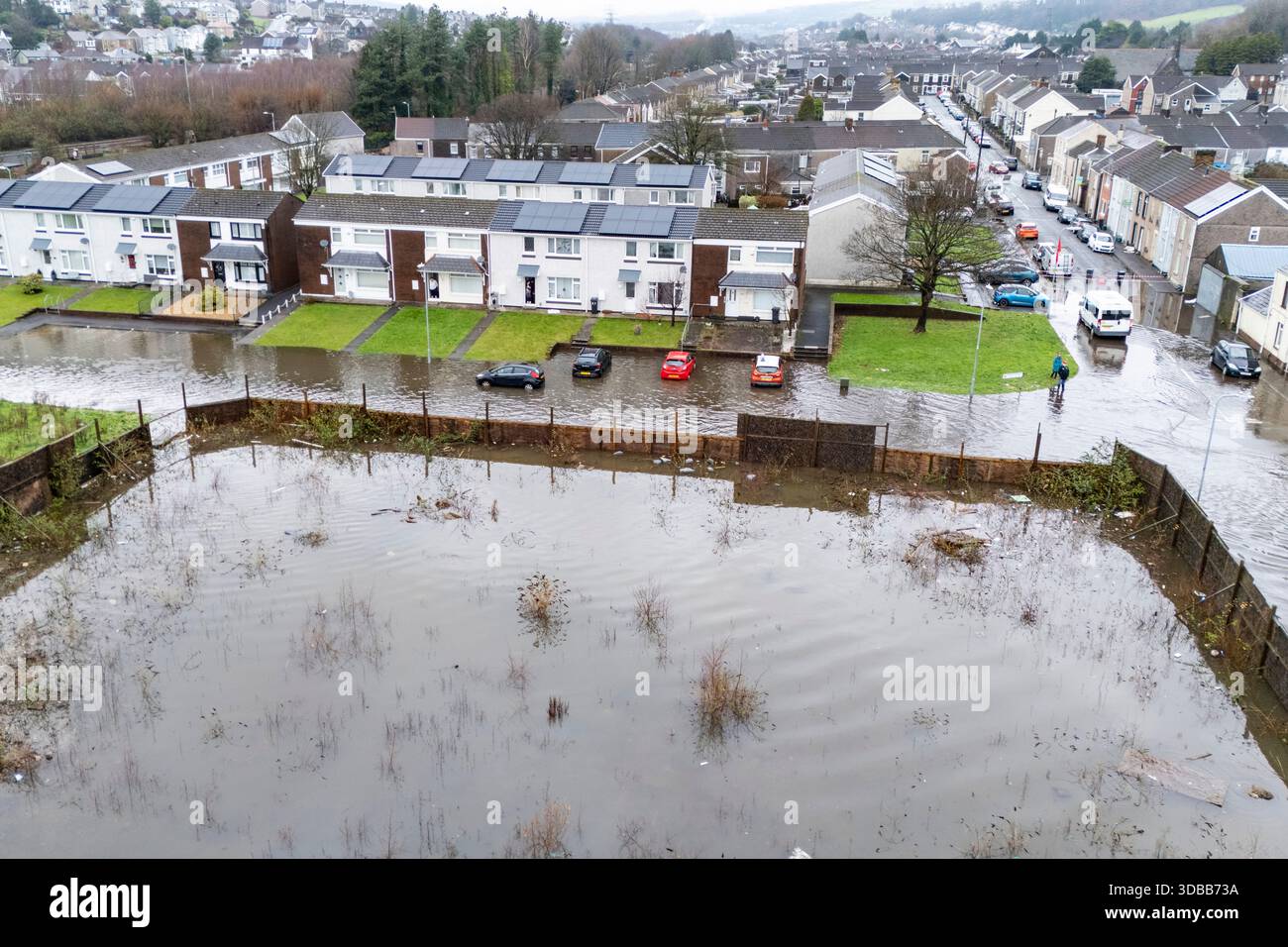 Flood water on Hunter Street in Briton Ferry, Neath. An amber rain ...