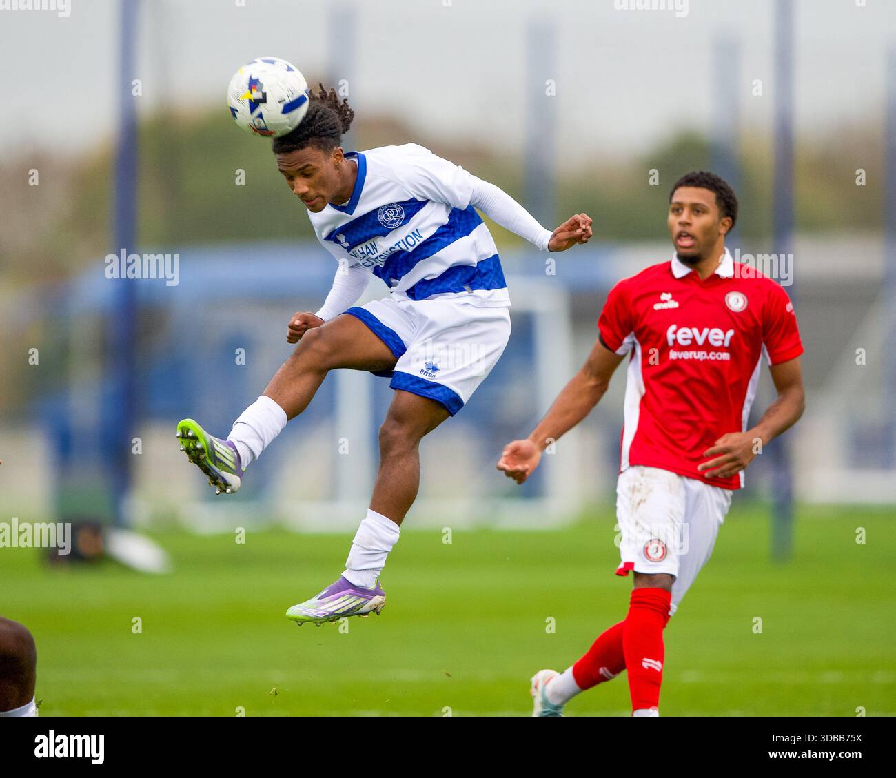 QPR's (3) Jaiden Putman heads clear during the Premier League PDL match ...