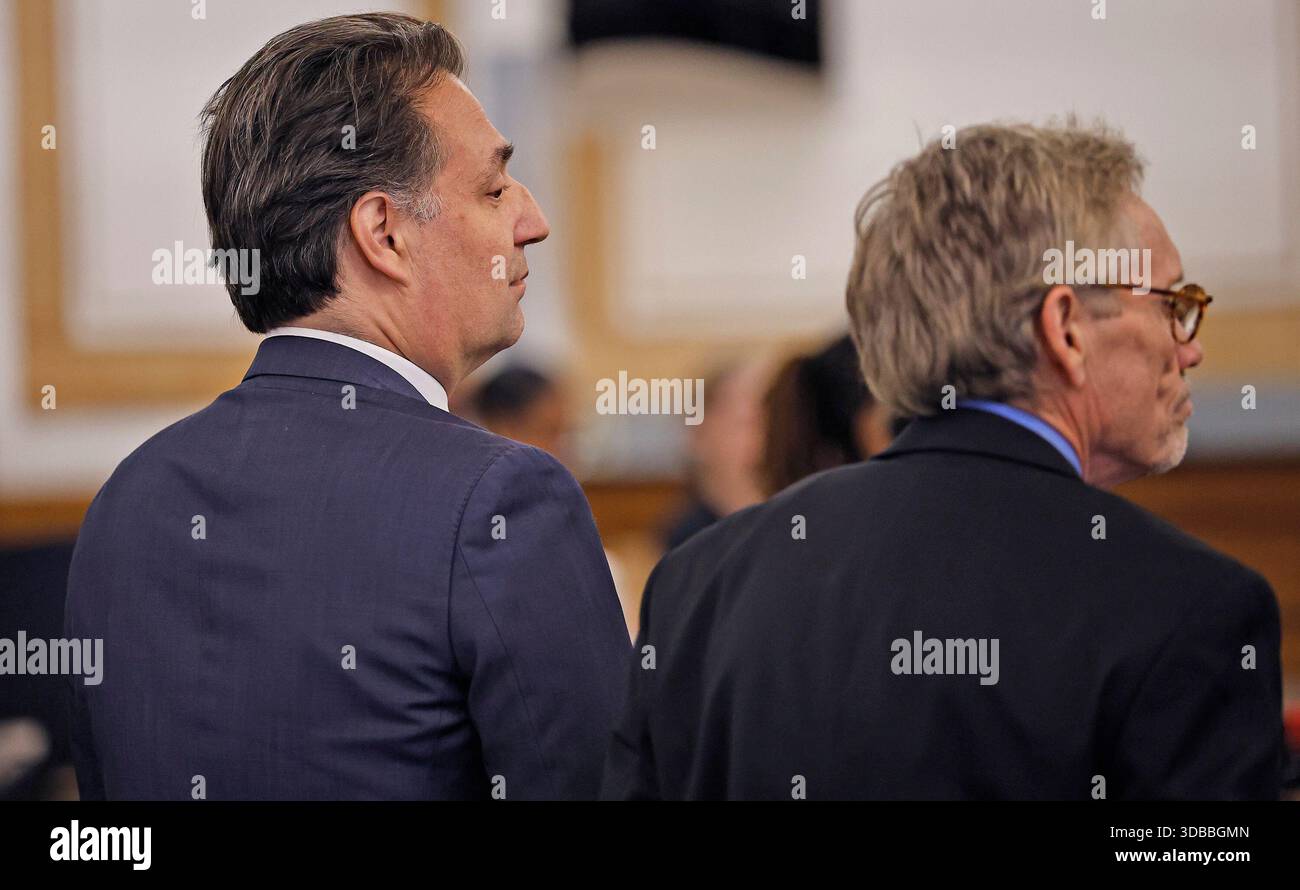 Brian Walshe, left, and lawyer Larry Tipton listen as the jury is ...