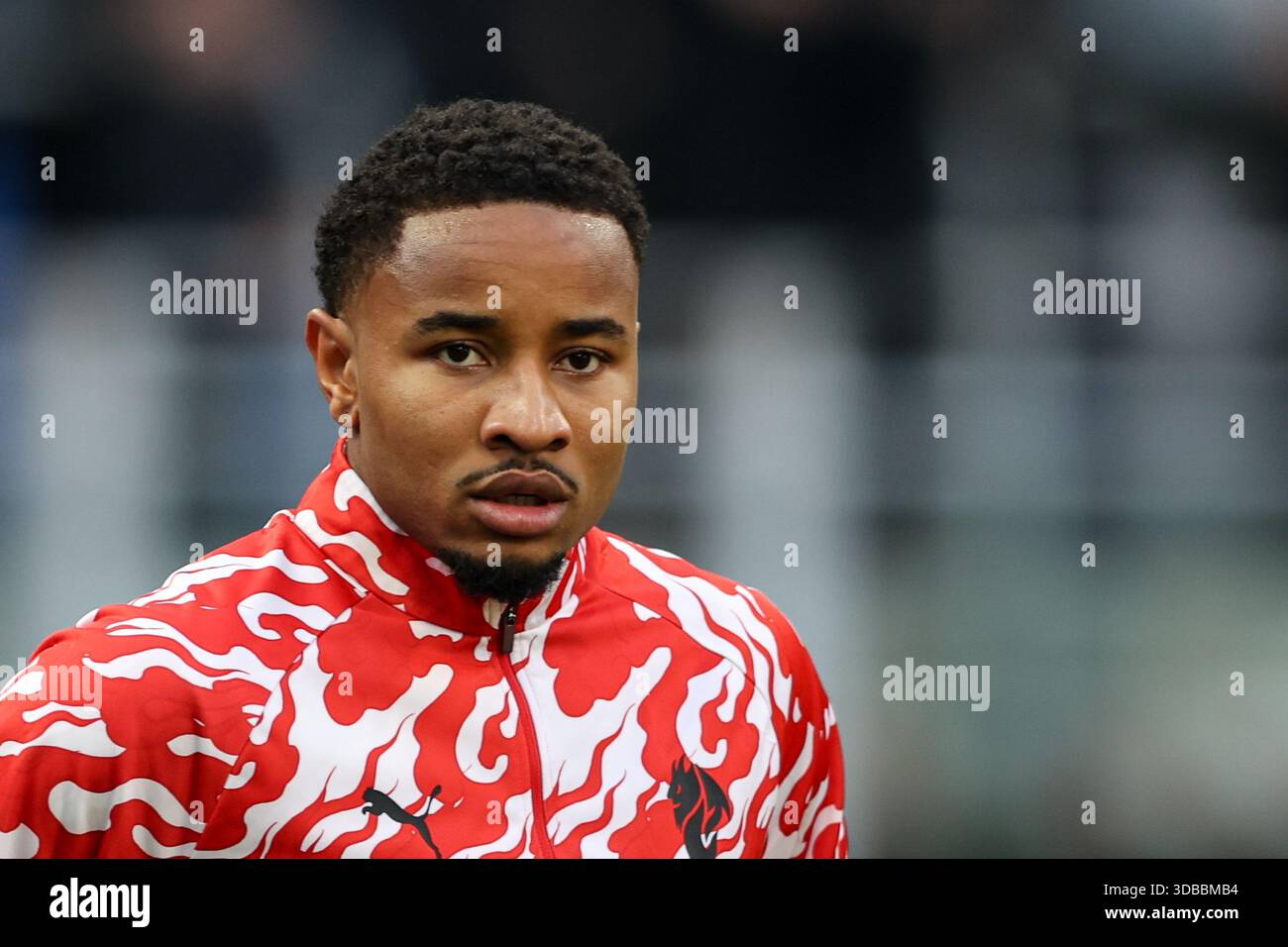 Christopher Nkunku of AC Milan is seen during the warm-up before the ...