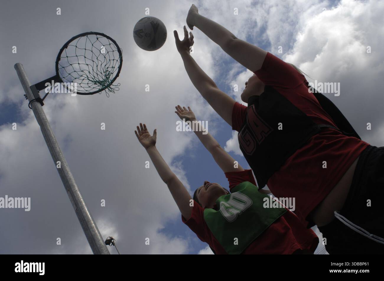 Female school pupils playing volleyball Stock Photo - Alamy