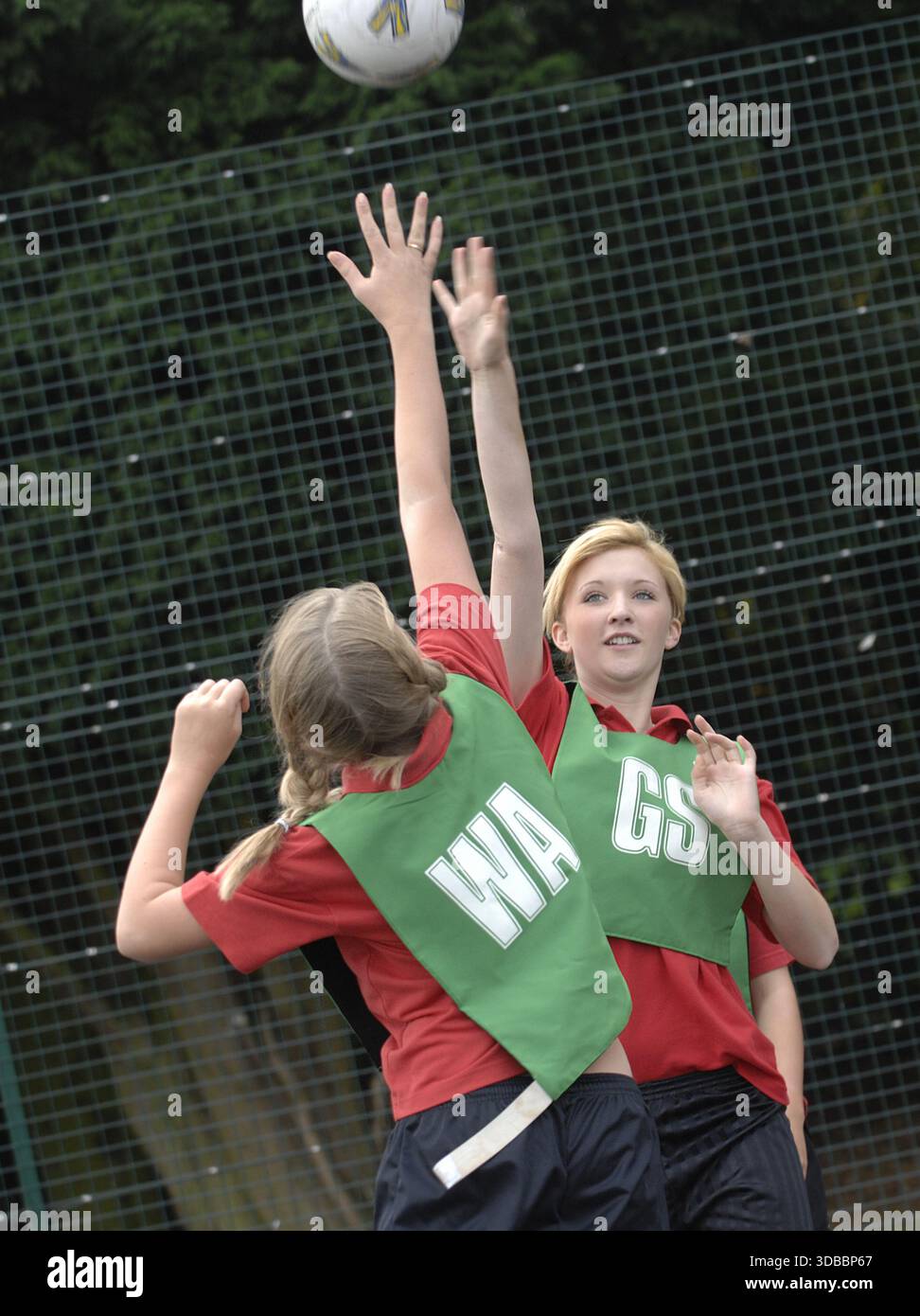Female school pupils playing volleyball Stock Photo - Alamy