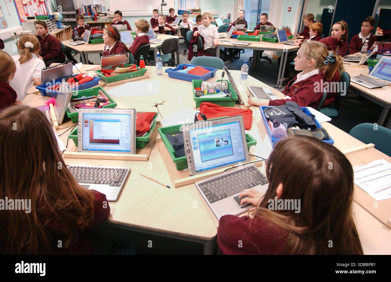 Primary School children working with computers Stock Photo - Alamy