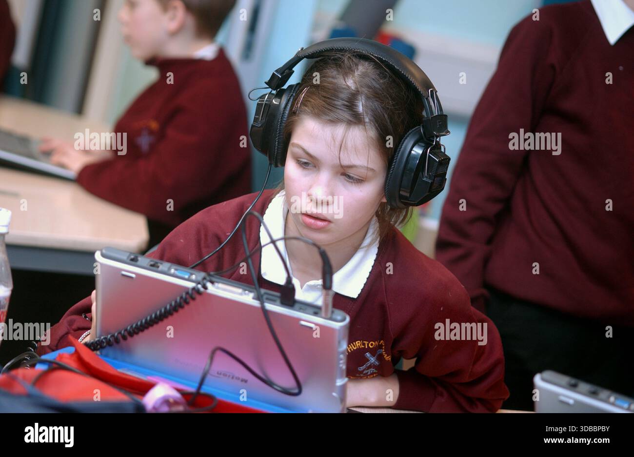 Primary School children working with computers Stock Photo - Alamy