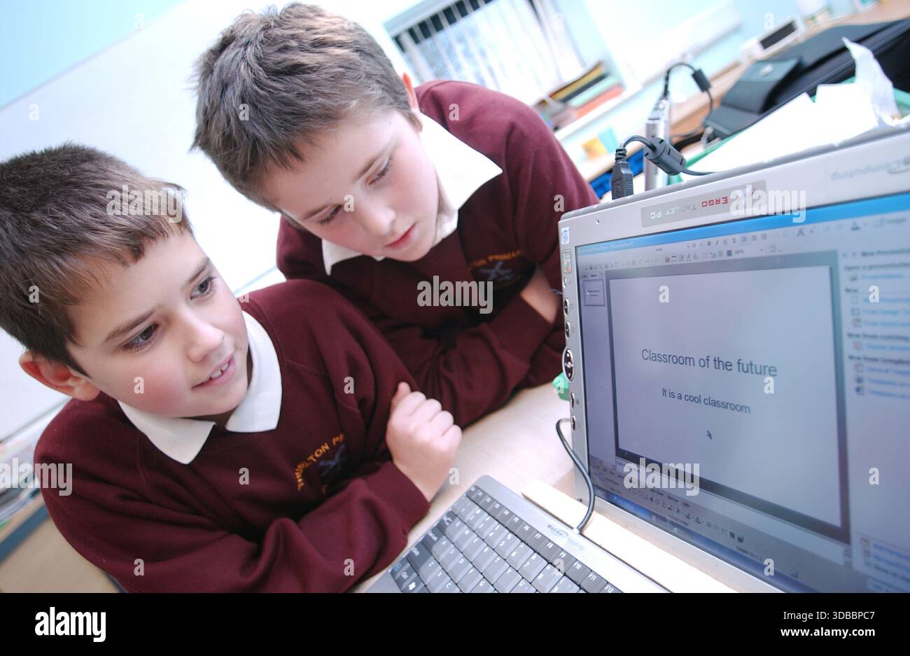 Primary School children working with computers Stock Photo - Alamy