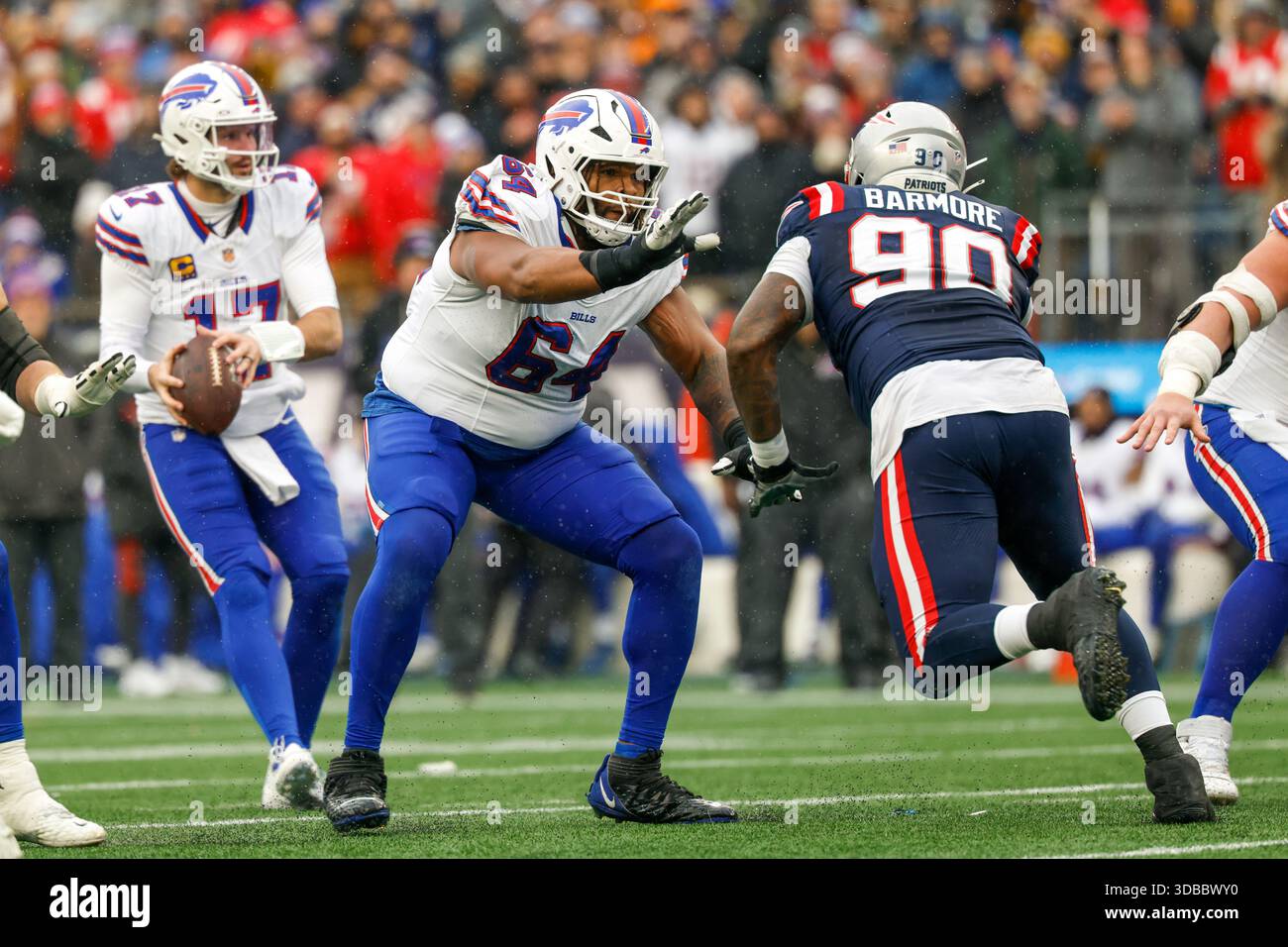 Buffalo Bills guard O'Cyrus Torrence (64) protects quarterback Josh ...