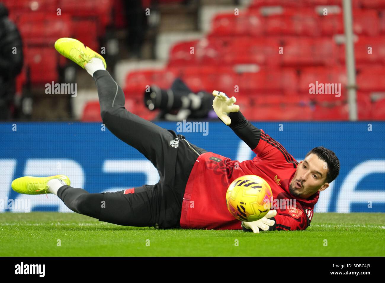 Manchester United's goalkeeper Altay Bayindir warms up for the Premier ...