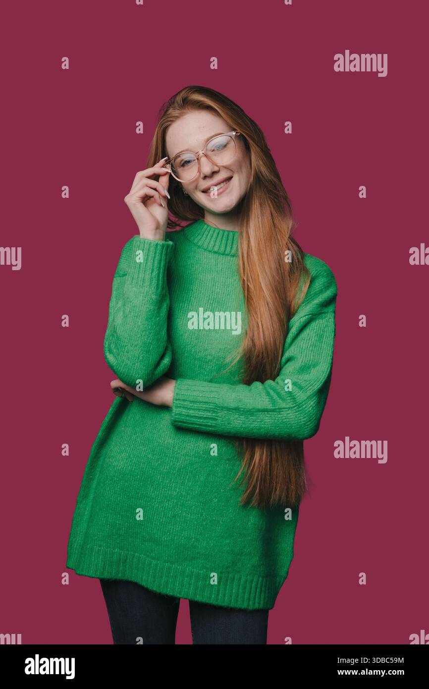Woman wearing green sweater glasses hi-res stock photography and images ...