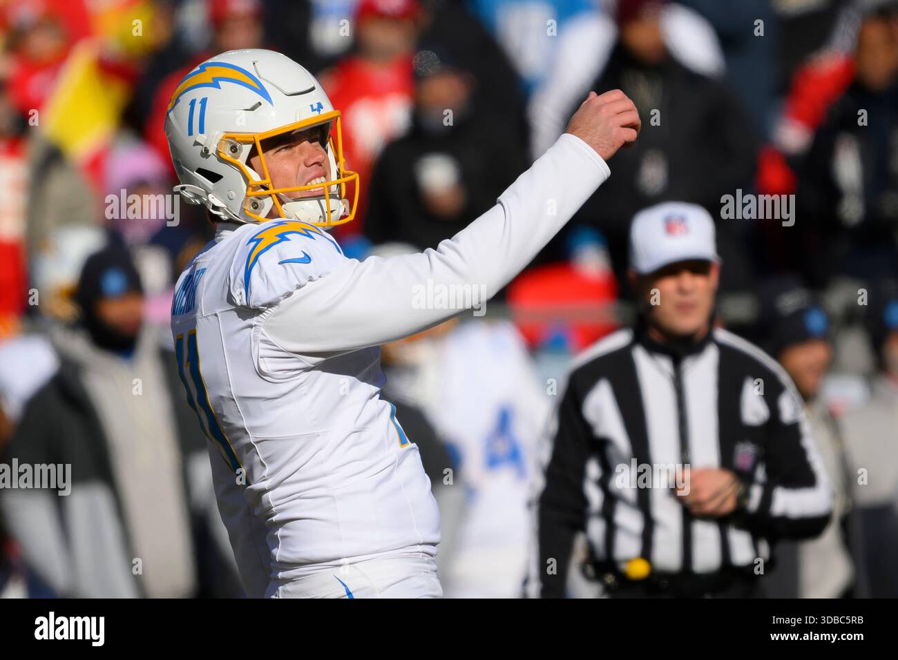 Los Angeles Chargers place kicker Cameron Dicker (11) follows through ...