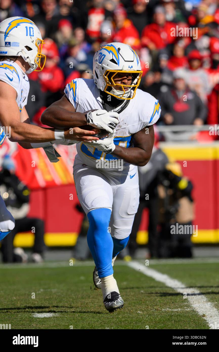 Los Angeles Chargers running back Kimani Vidal (30) takes a handoff ...