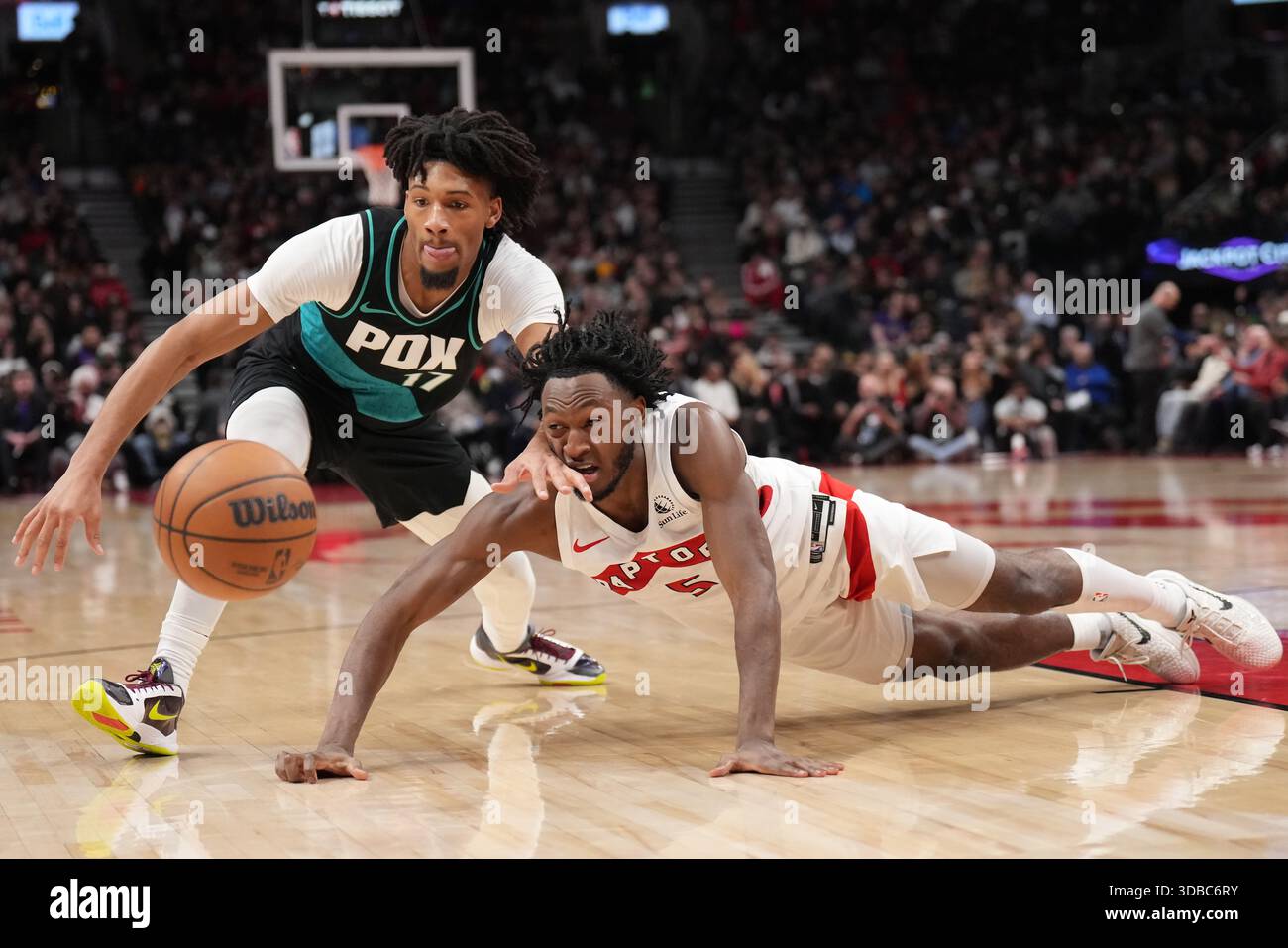 Toronto Raptors guard Immanuel Quickley (5) and Portland Trail Blazers ...