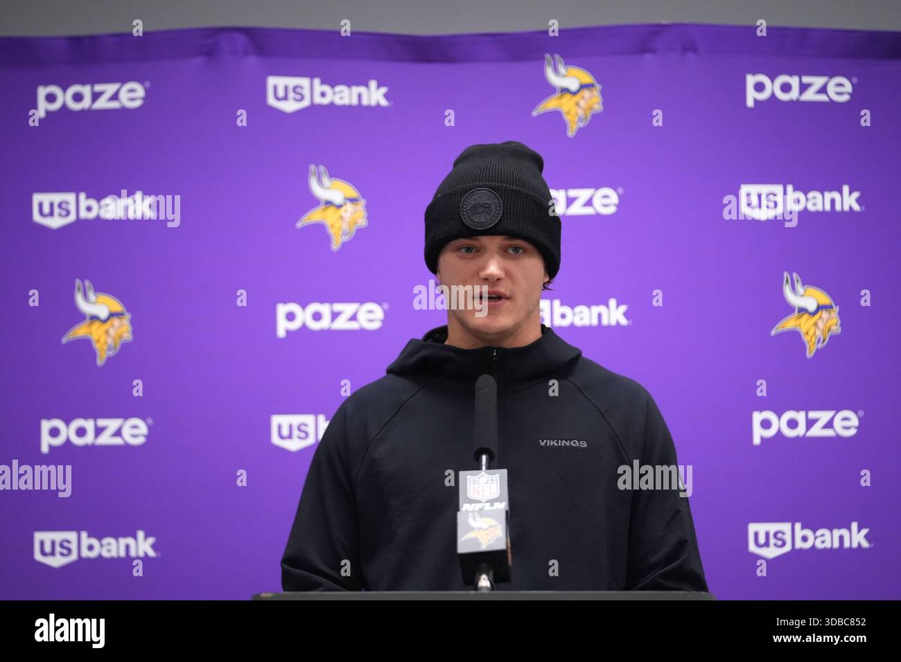 Minnesota Vikings quarterback J.J. McCarthy (9) talks to reporters ...
