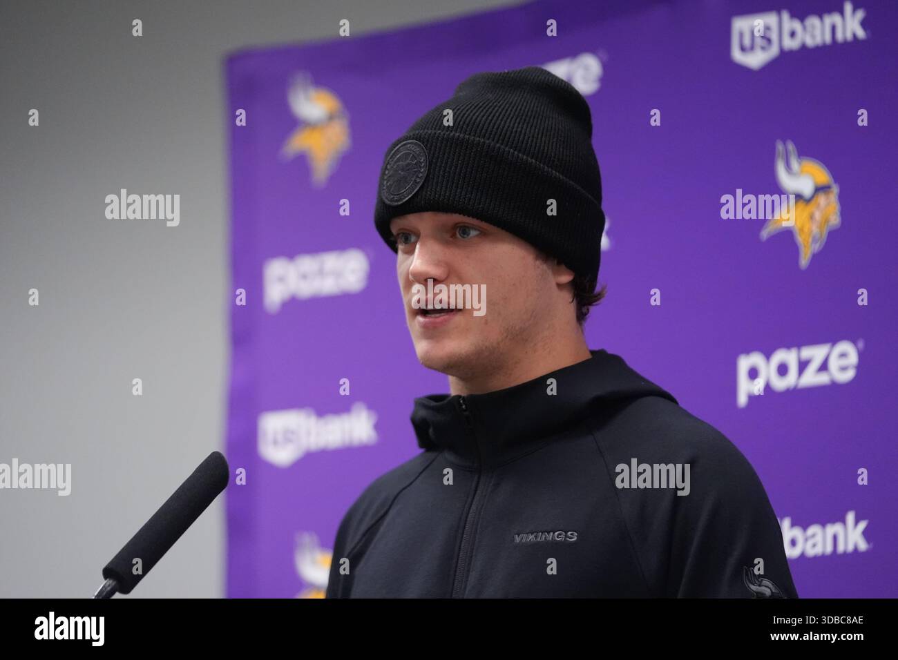 Minnesota Vikings quarterback J.J. McCarthy (9) talks to reporters ...