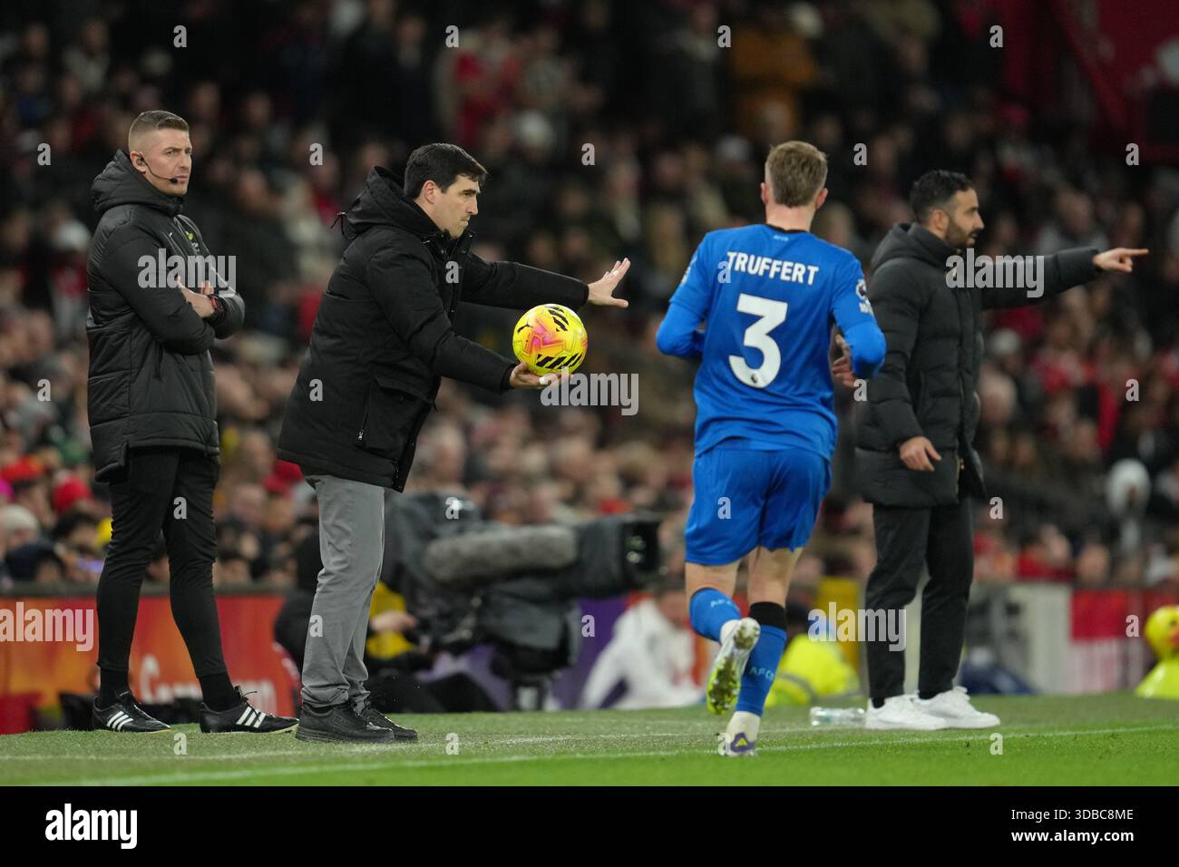 Bournemouth's head coach Andoni Iraola holds the ball during a Premier ...