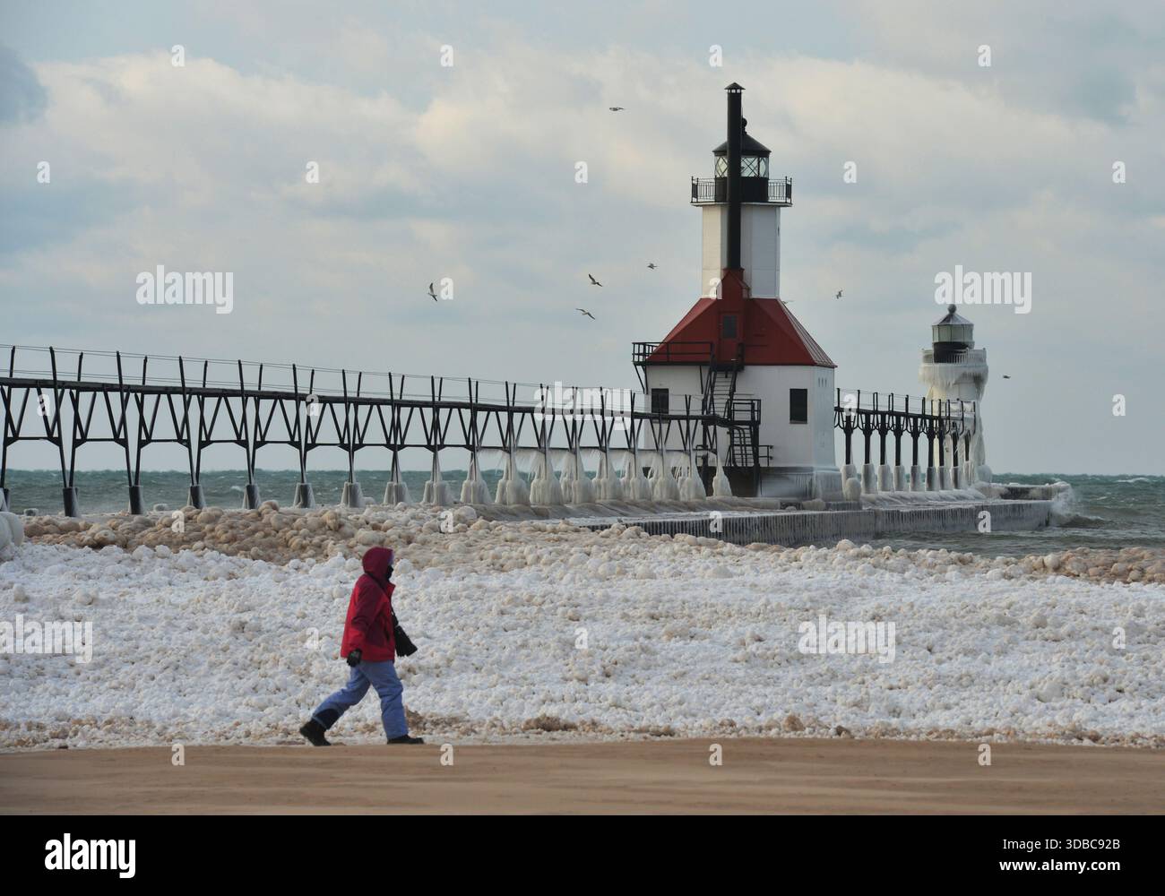 Ice covers the St. Joseph Inner and Outer Lighthouses Monday, Dec. 15 ...