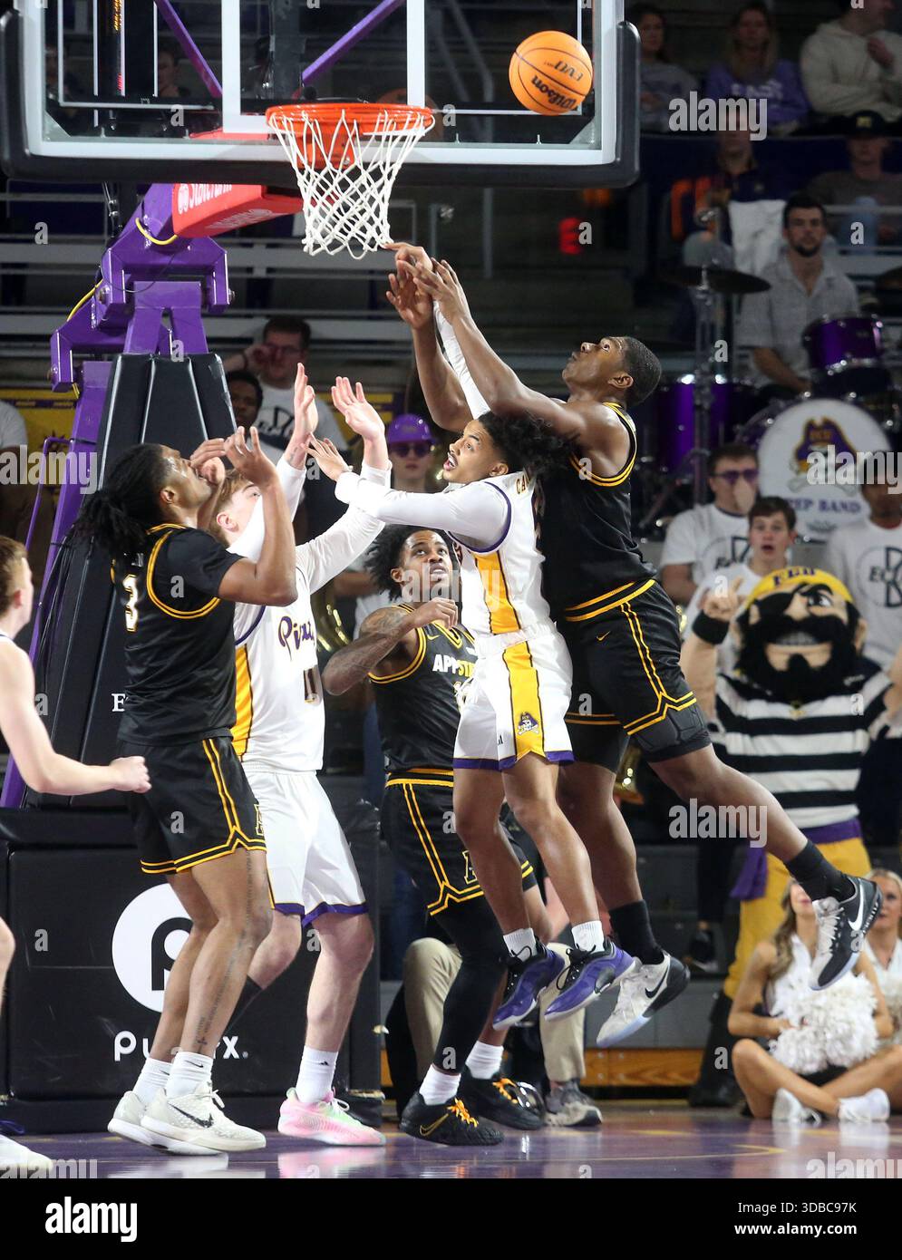 App State's Michael Marcus Jr. (44) goes over the back of ECU's Corey ...