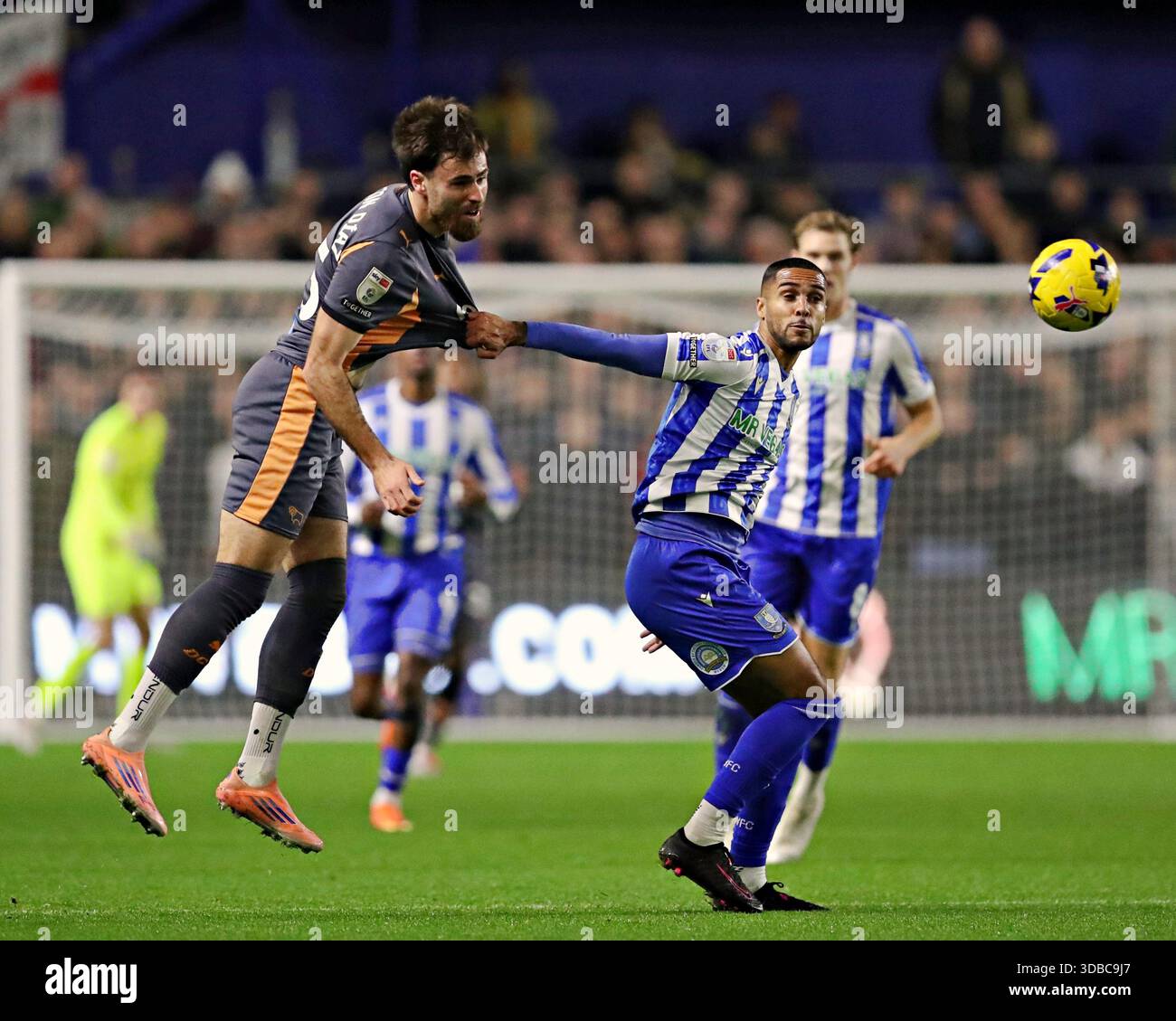 Max Lowe of Sheffield Wednesday pressures Ben Brereton-Diaz of Derby ...