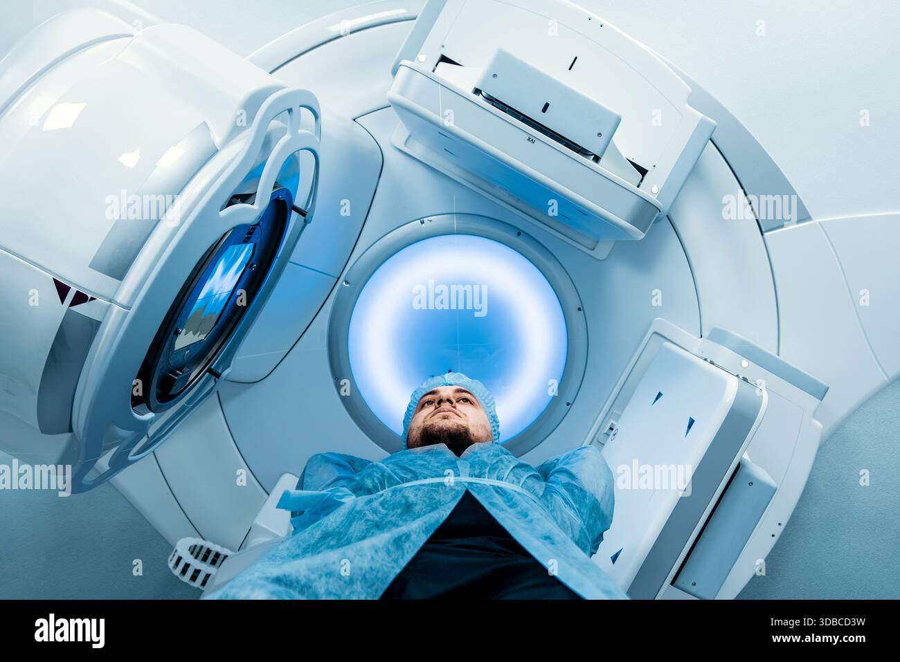Patient positioned on treatment table within linear accelerator ...
