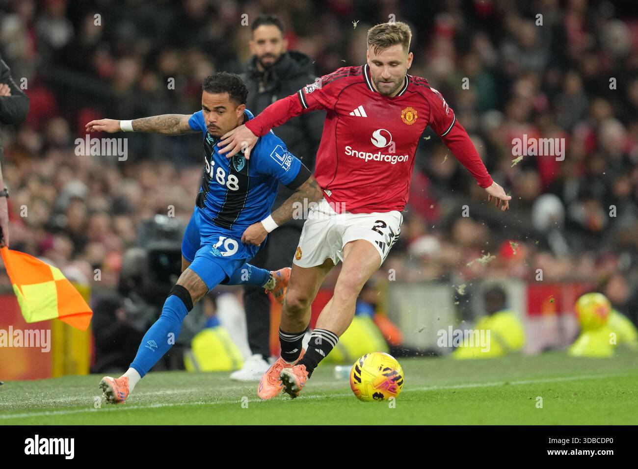 Bournemouth's Justin Kluivert, left, and Manchester United's Luke Shaw ...