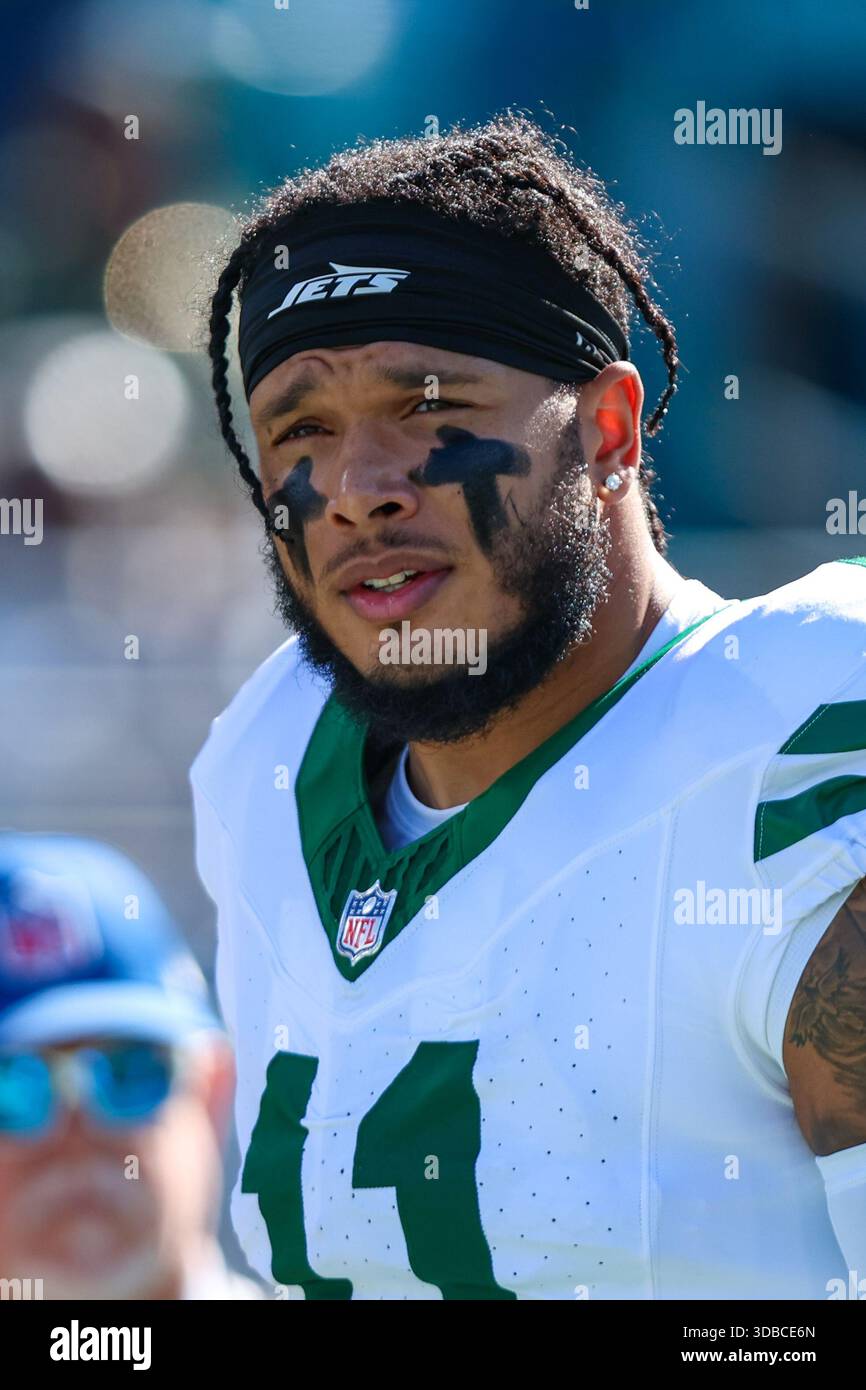 New York Jets linebacker Jermaine Johnson (11) walks the sideline ...