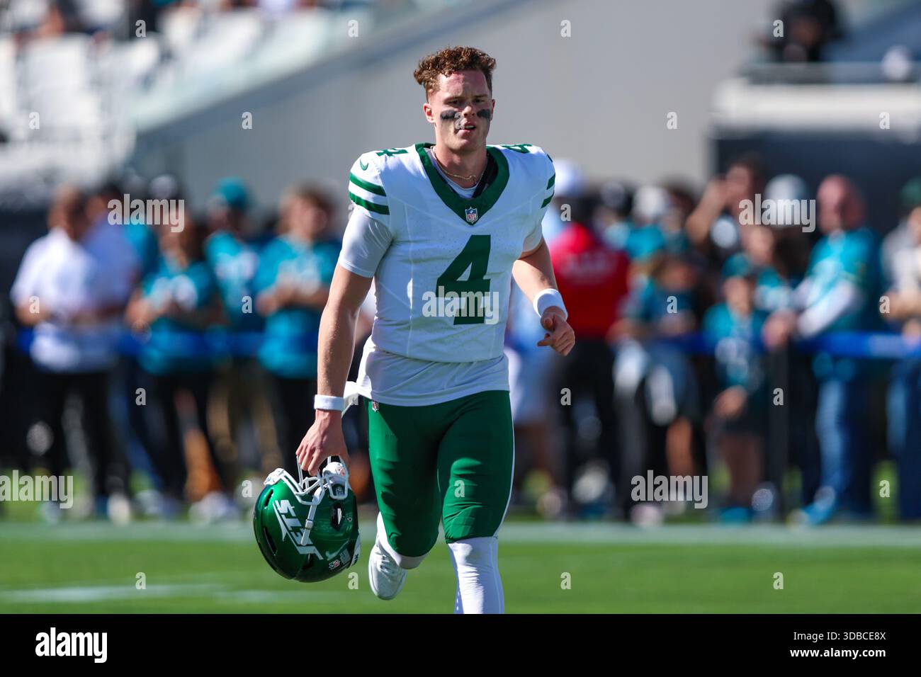 New York Jets quarterback Brady Cook (4) leaves the field after warm ...