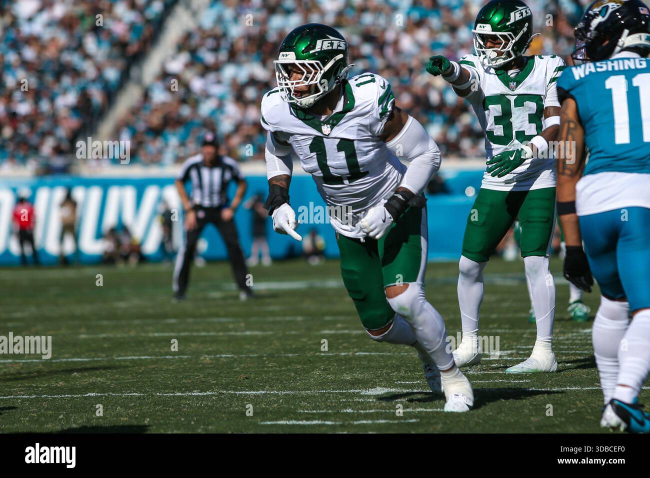 New York Jets linebacker Jermaine Johnson (11) rushes during an NFL ...