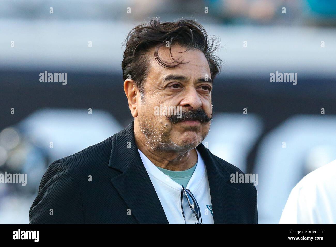 Jacksonville Jaguars owner Shahid Khan watches a ceremony at halftime ...