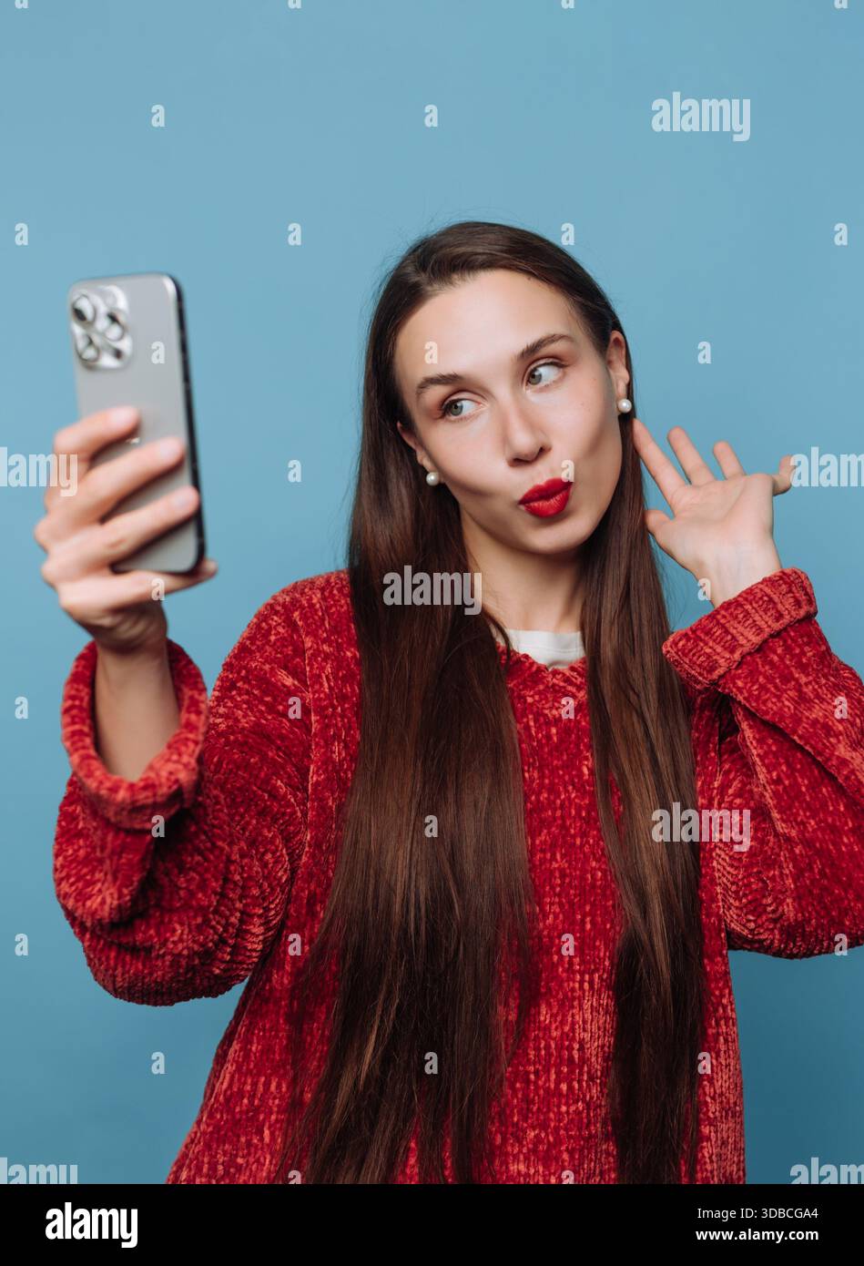 Woman smiles waves hand in hi-res stock photography and images - Alamy