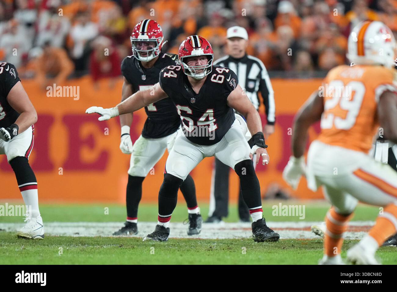 Atlanta Falcons center Ryan Neuzil (64) protects the pocket during an ...