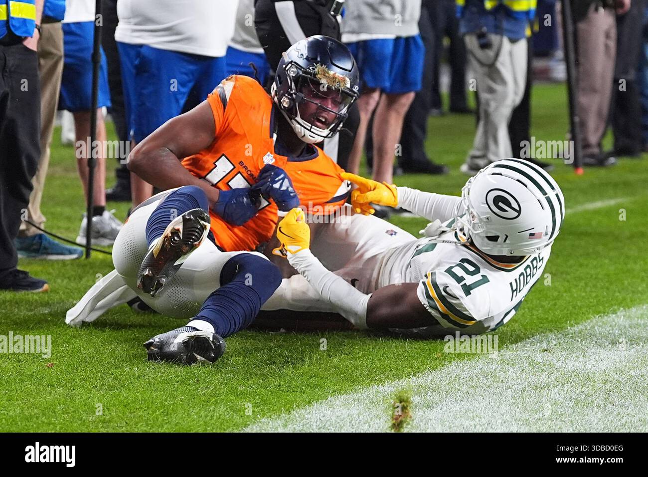 Green Bay Packers cornerback Nate Hobbs (21) breaks up a pass intended ...