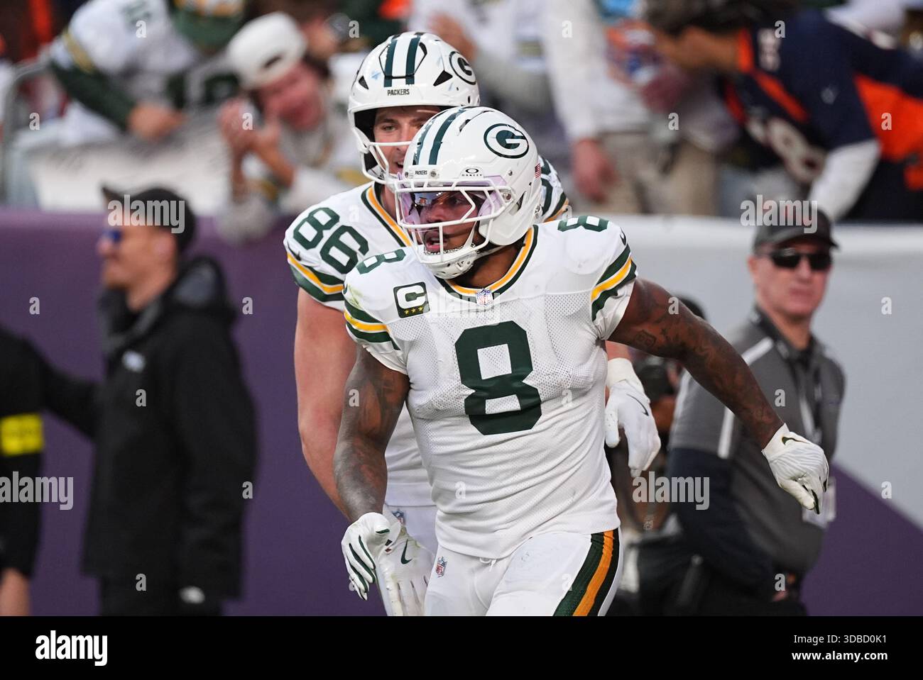 Green Bay Packers running back Josh Jacobs (8) is congratulated after ...