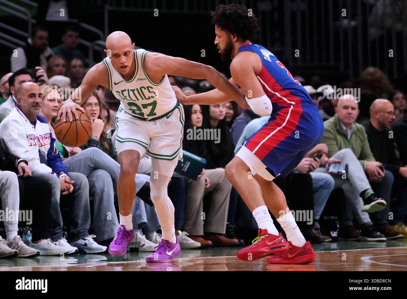 Boston Celtics guard Jordan Walsh (27) tries to break away from Detroit ...