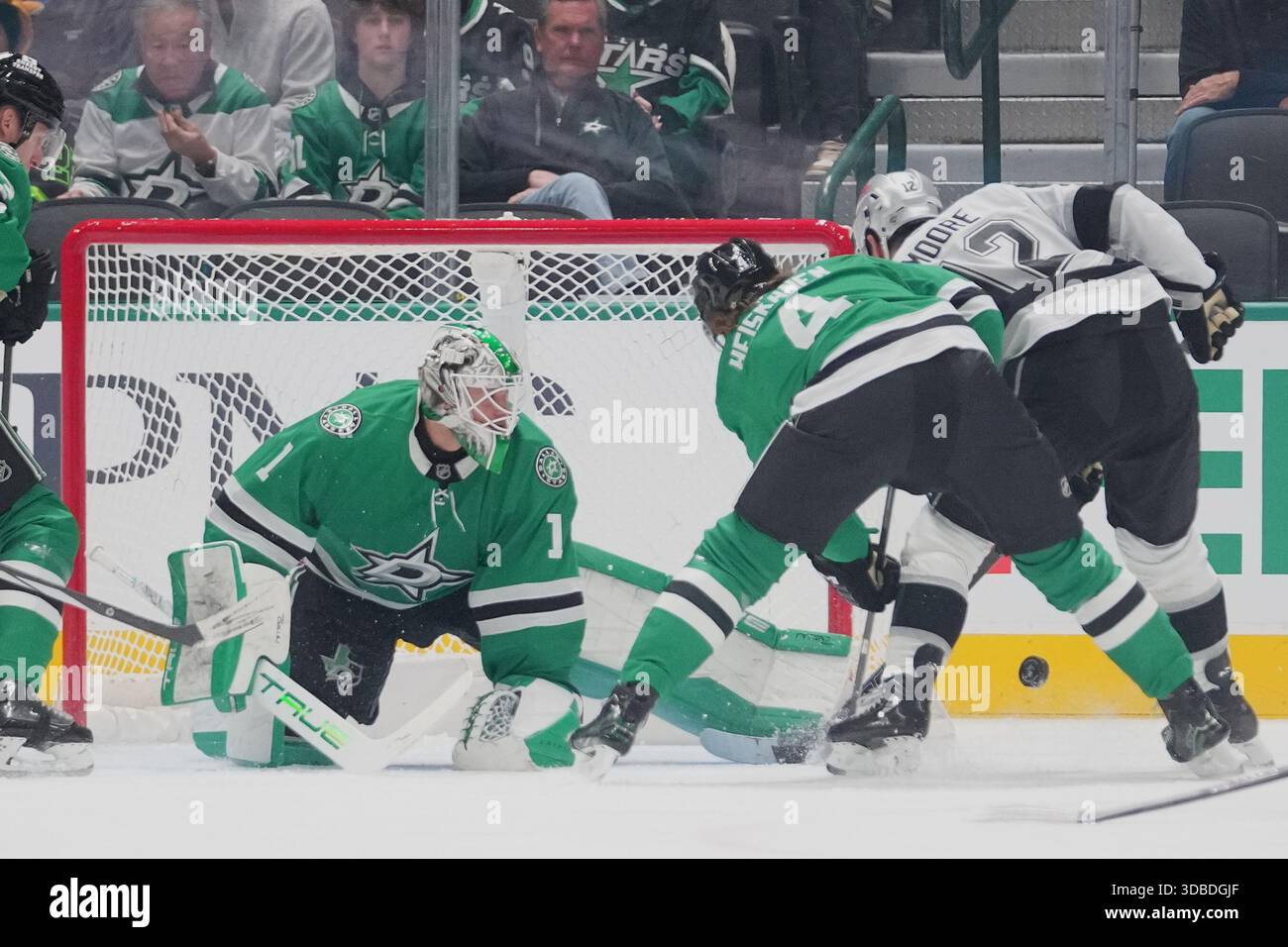 Dallas Stars goaltender Casey Desmith (1) makes a kick save as Los ...