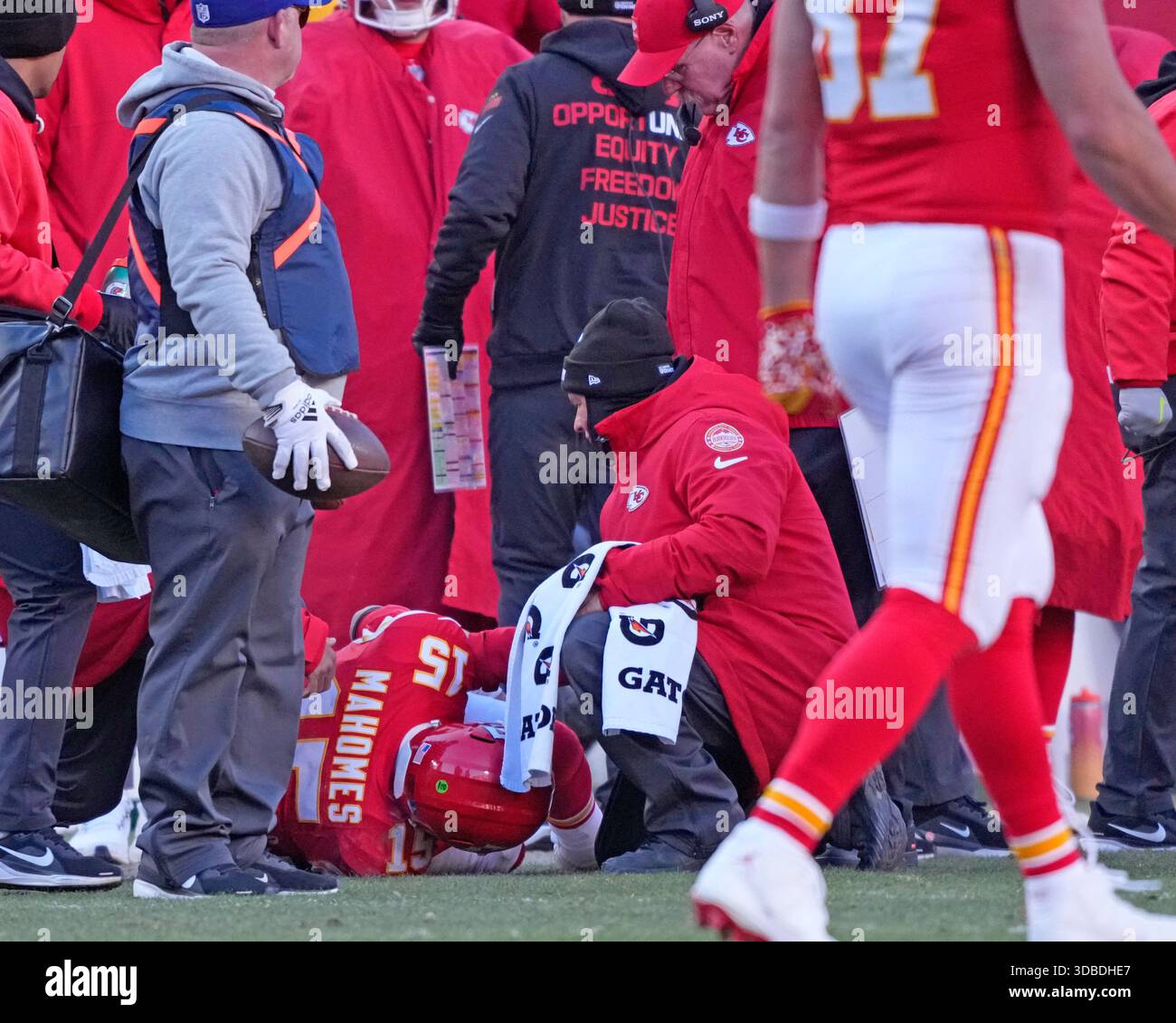 Chiefs training staff attend to Kansas City Chiefs quarterback Patrick ...