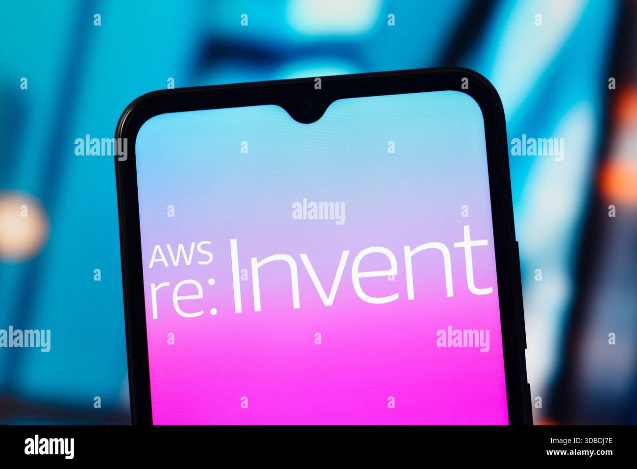 In this photo illustration, the AWS re:Invent logo is seen displayed on ...