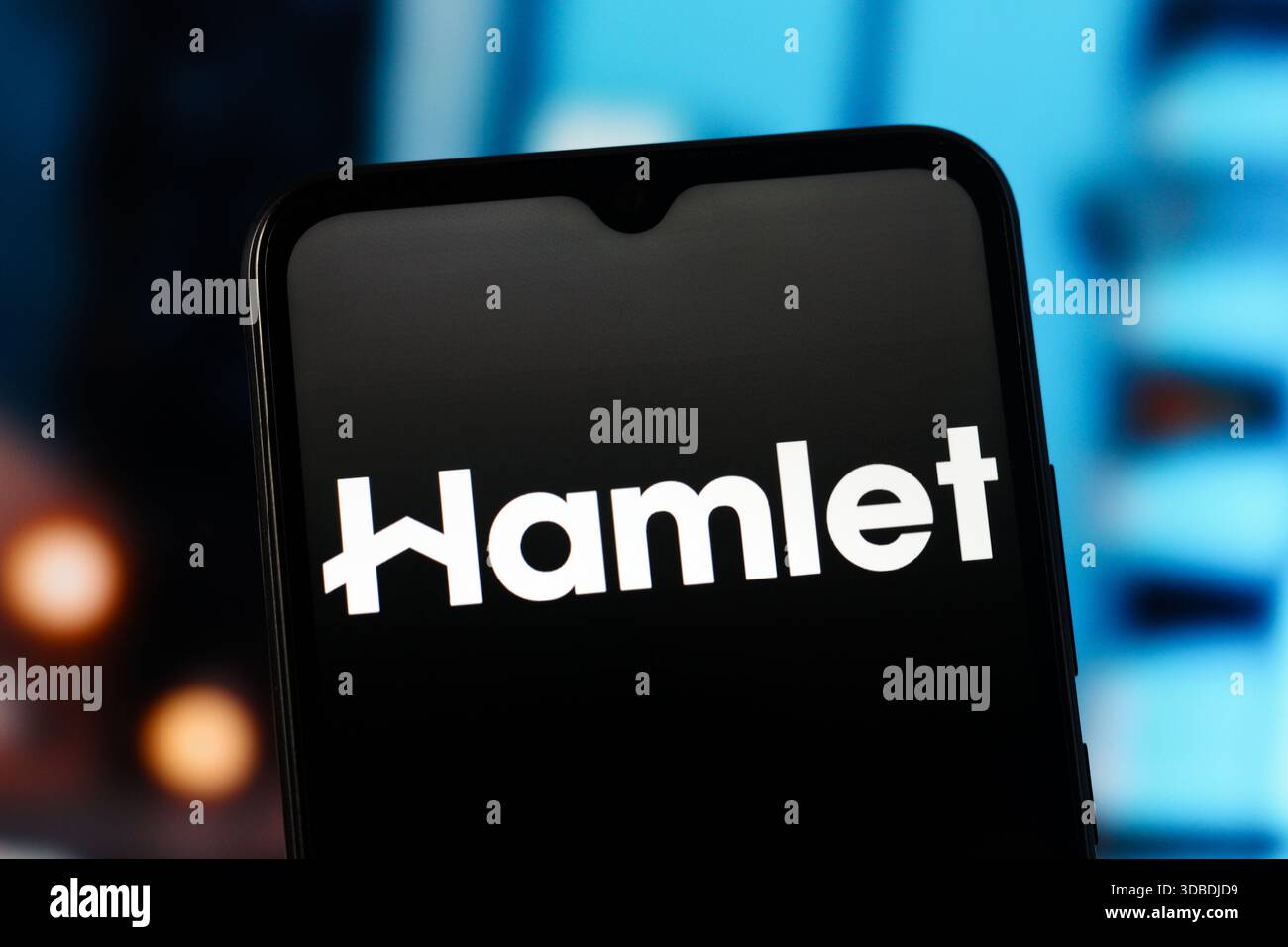 In this photo illustration, the Hamlet logo is seen displayed on a ...