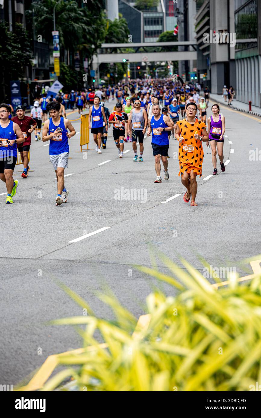 Runners on SCSM Standard Chartered Singapore Marathon 2025, Running on ...