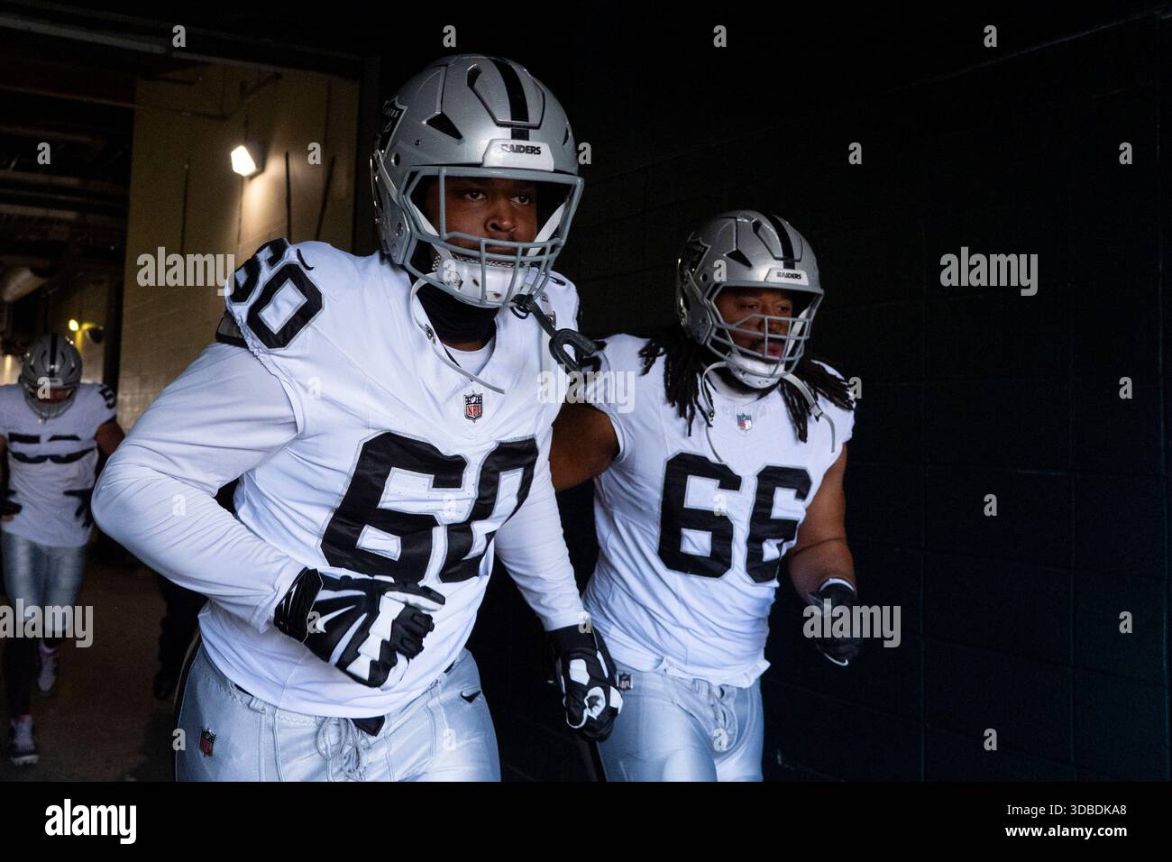 Las Vegas Raiders tackle Charles Grant, left, and guard Dylan Parham ...