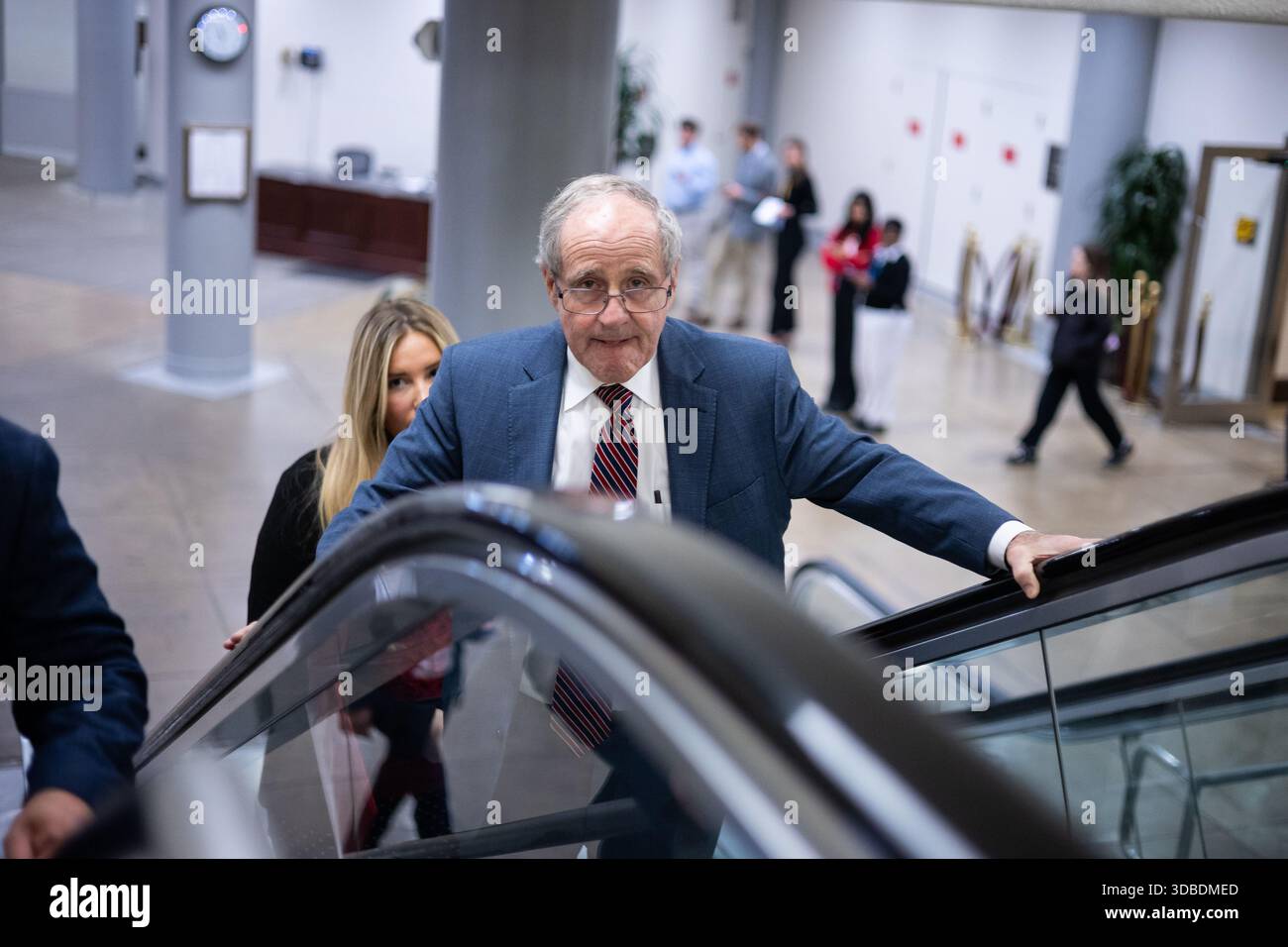 Sen. James Risch (R-Idaho) ascends on an escalator on his way to a vote ...