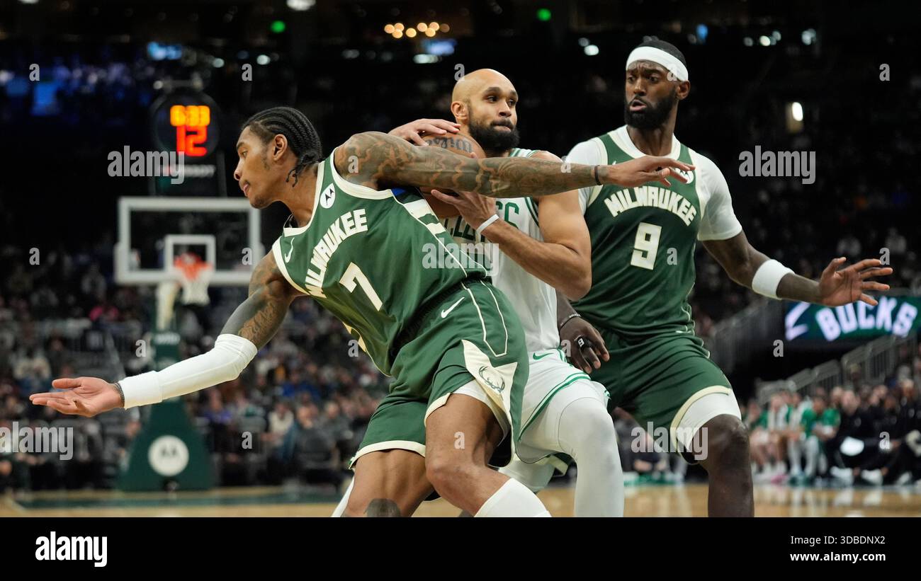 Boston Celtics' Derrick White drives to the basket between Milwaukee ...