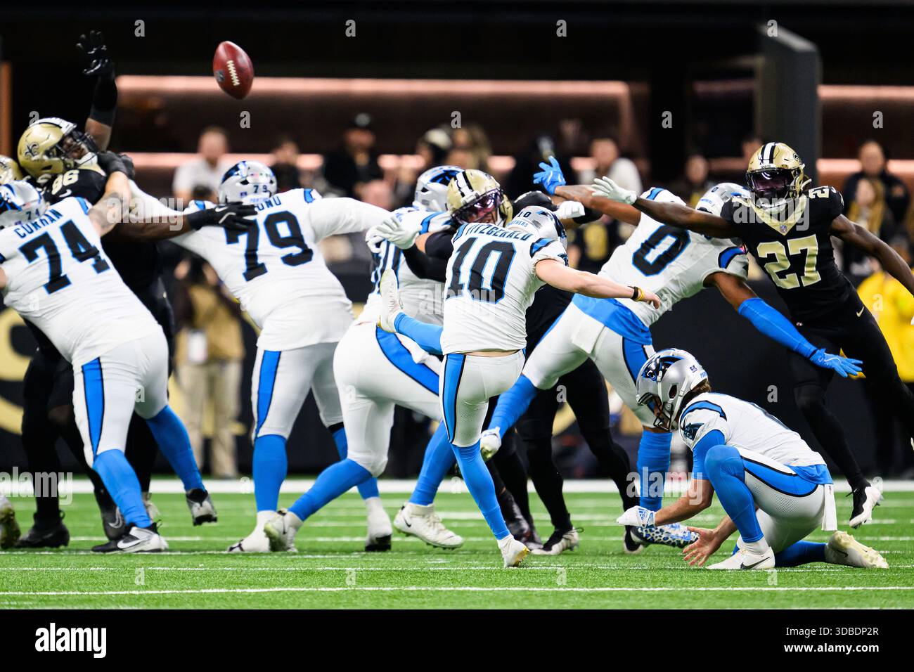 Carolina Panthers kicker Ryan Fitzgerald (10) kicks in the first half ...