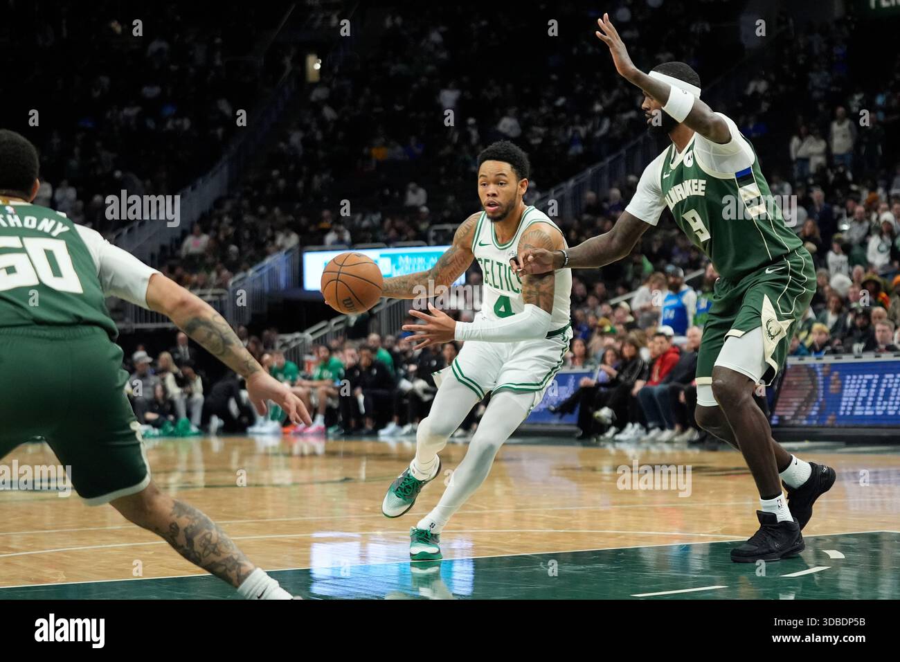 Boston Celtics' Anfernee Simons drives to the basket against Milwaukee ...